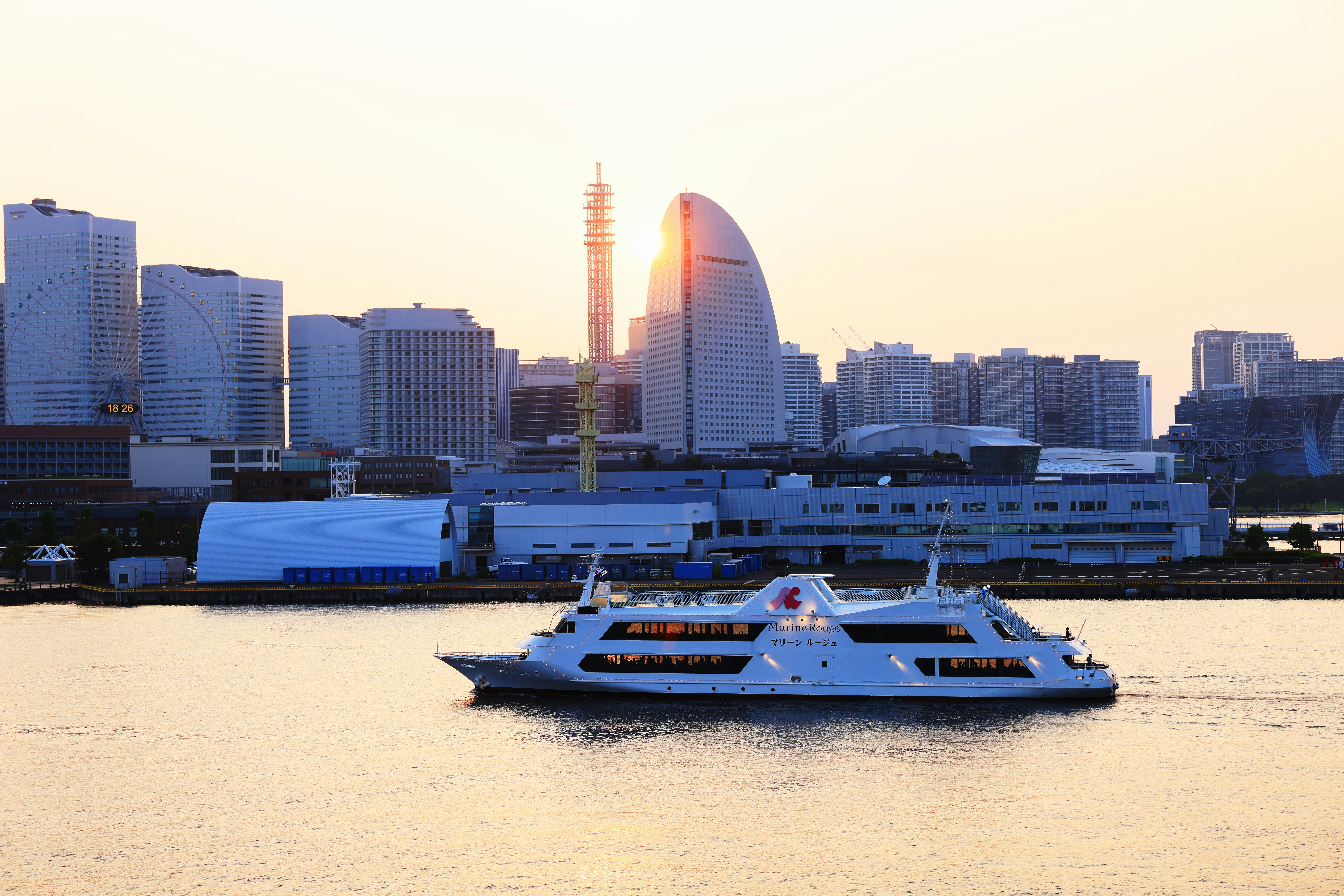 Sunlit Harbor Ferry Amid Skyscraper Silhouettes