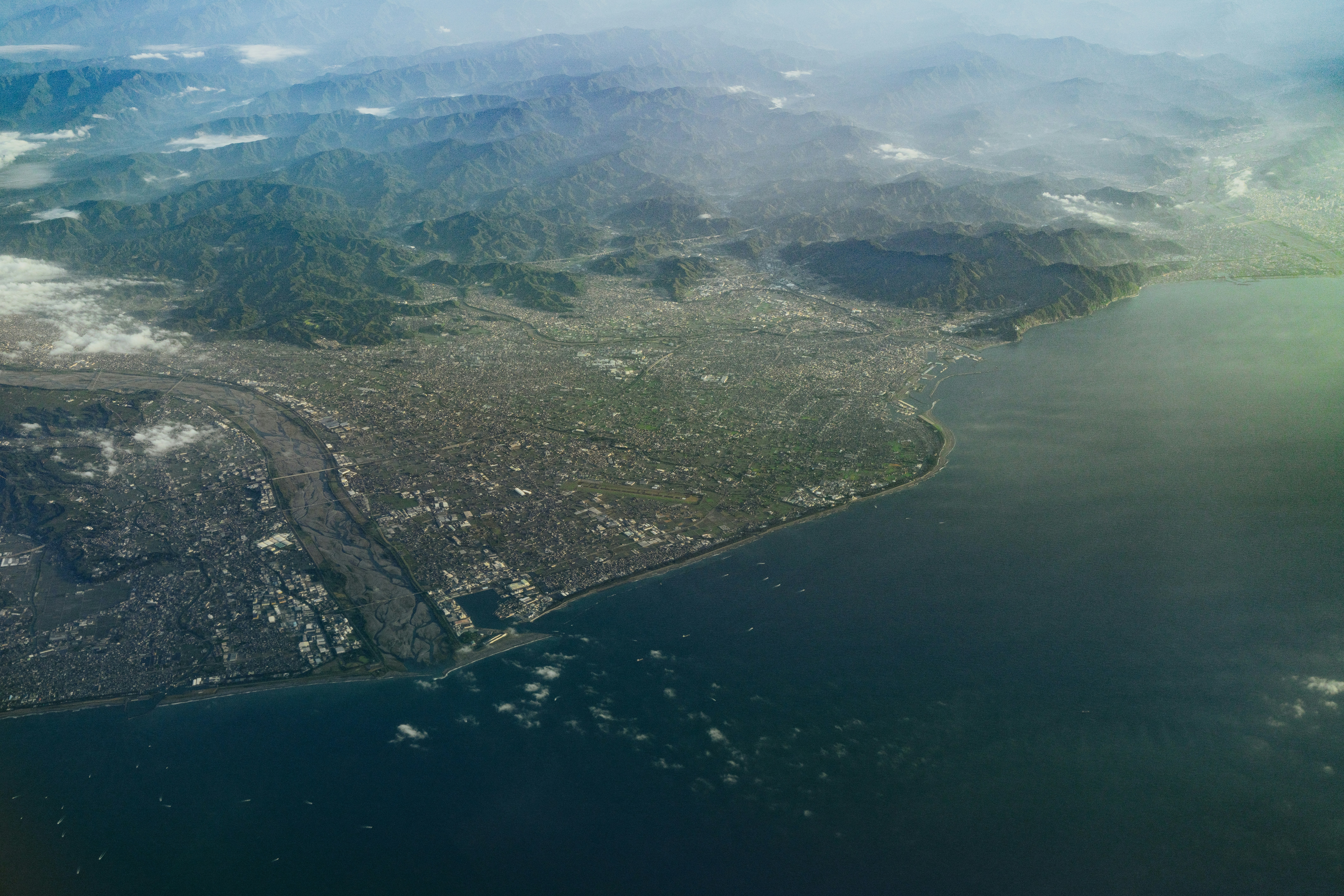 Coastal City Unfolding Along the Bay