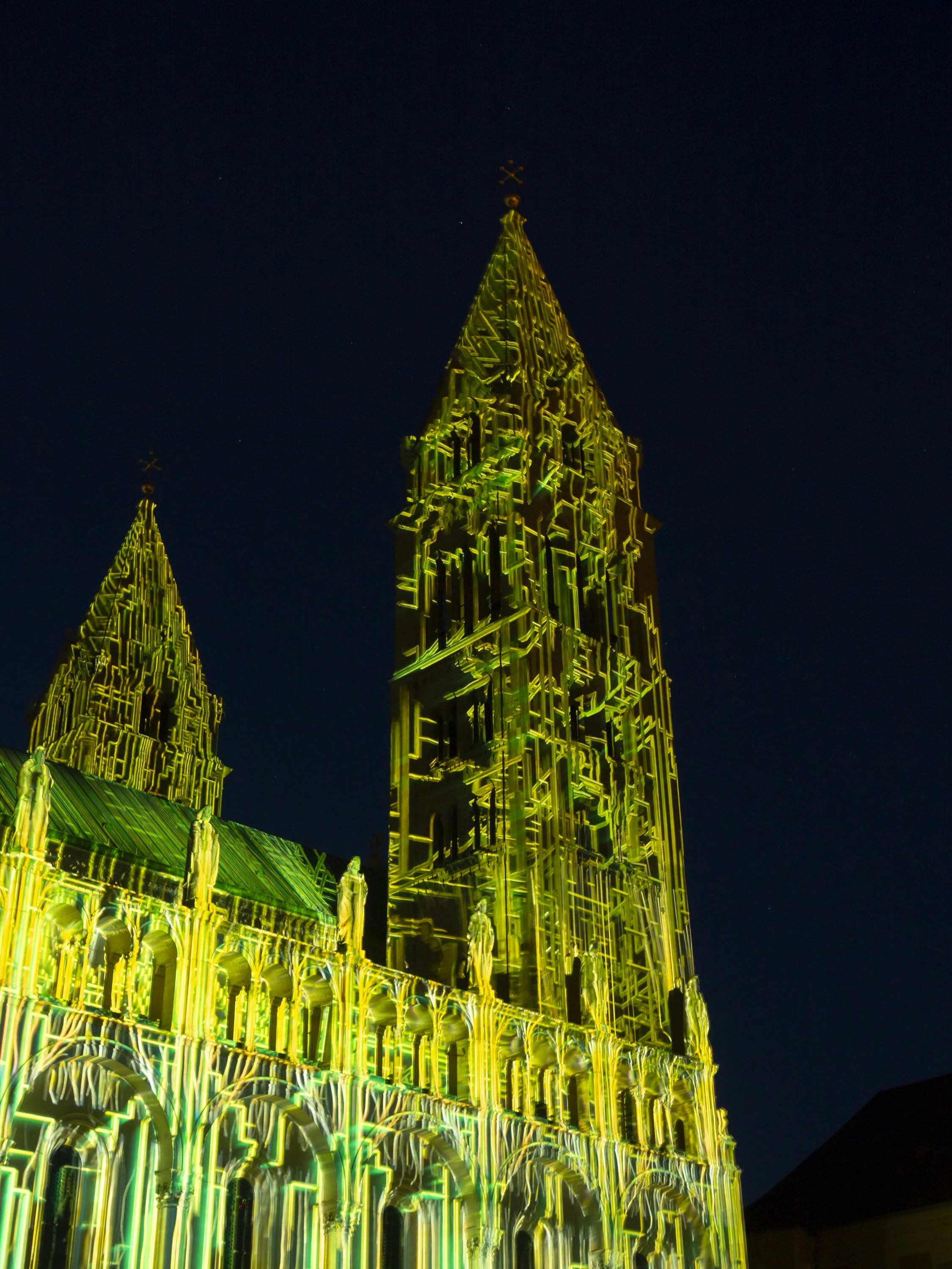 Luminous Gothic Spires Under Night Sky
