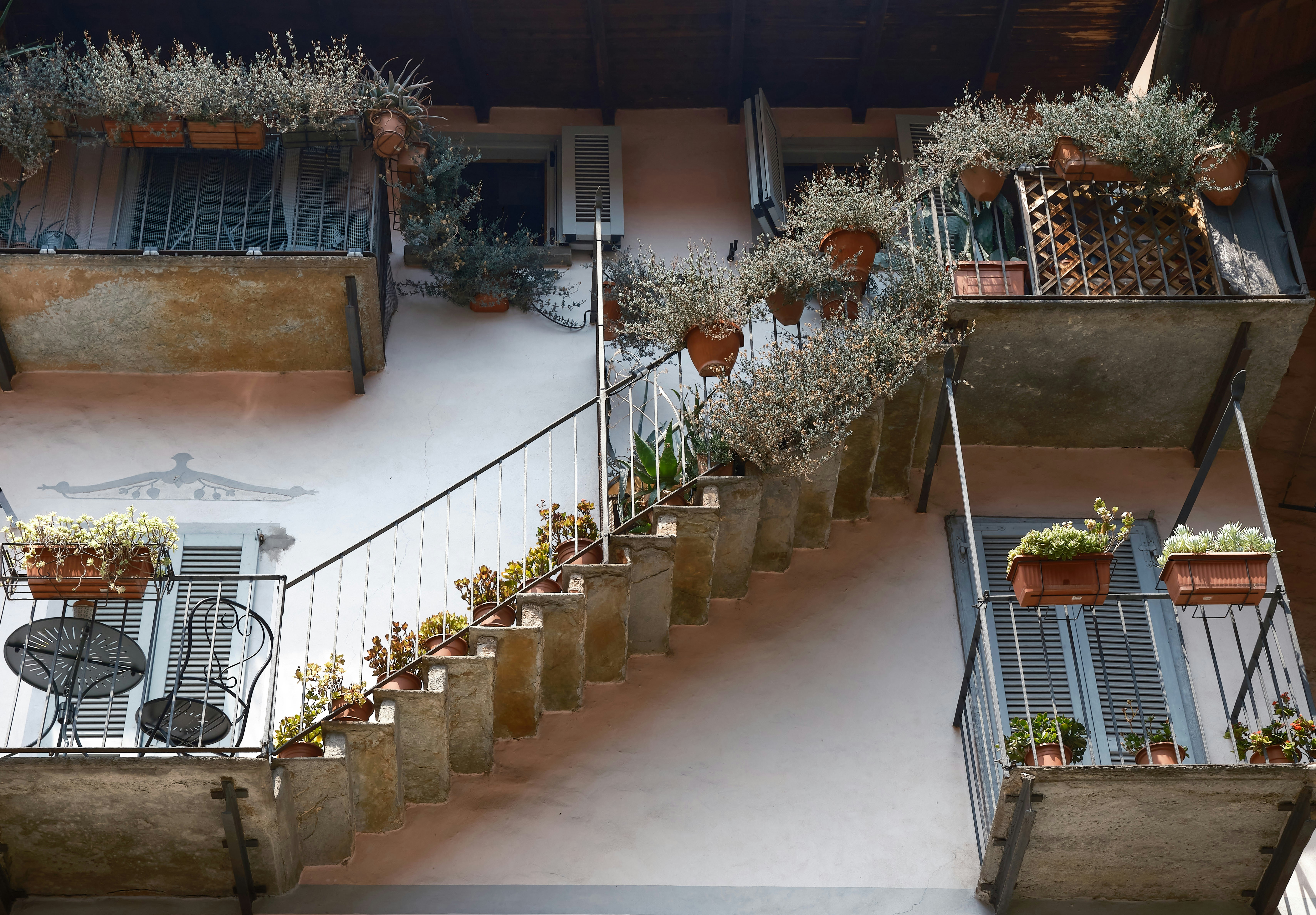 Staircase Garden: Terraced Balcony Fragments in Muted Light