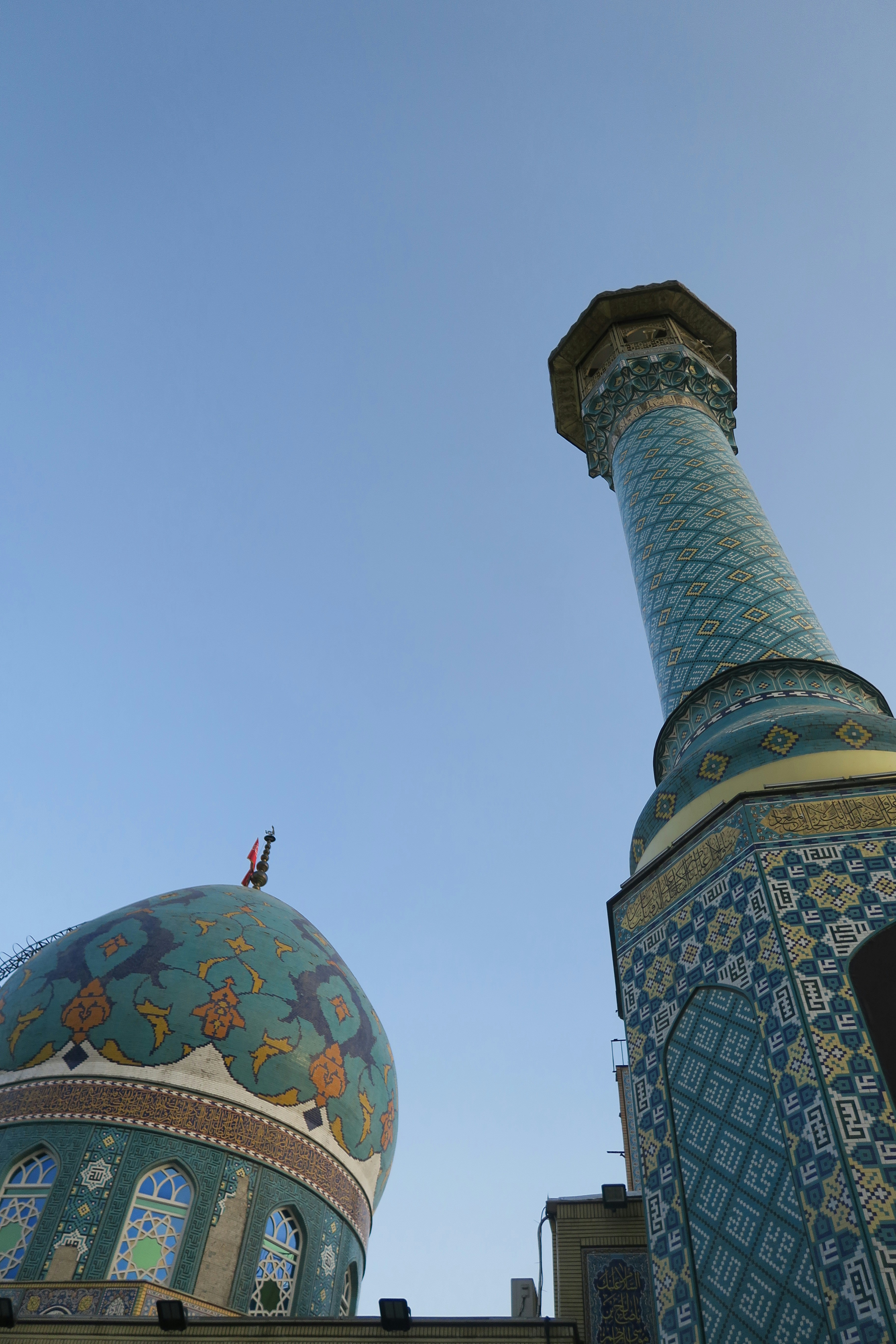 Blue Tile Tower and Dome: A Persian Mosque silhouette under a Clear Sky