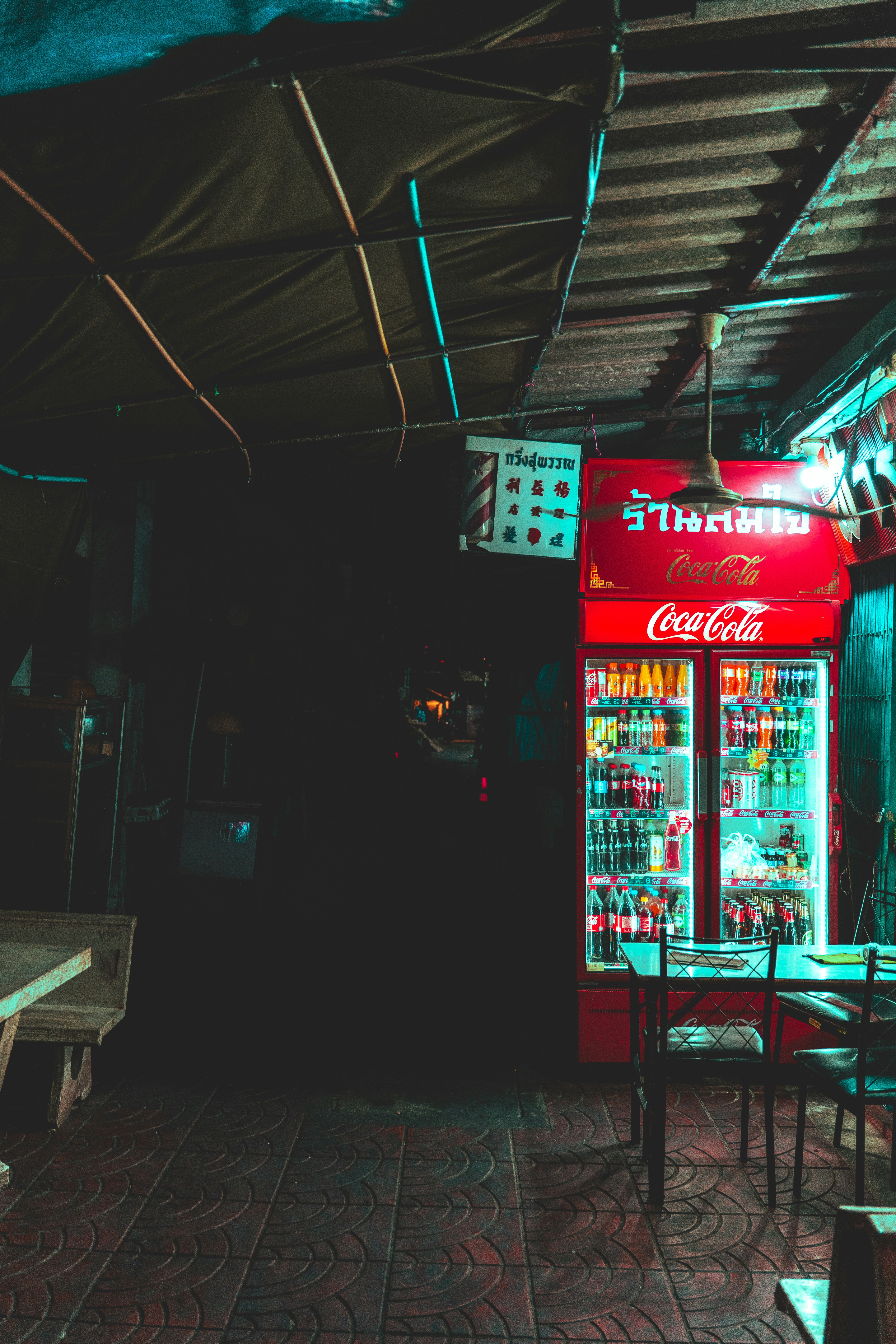 Neon Coca-Cola Haven in a Quiet Alley