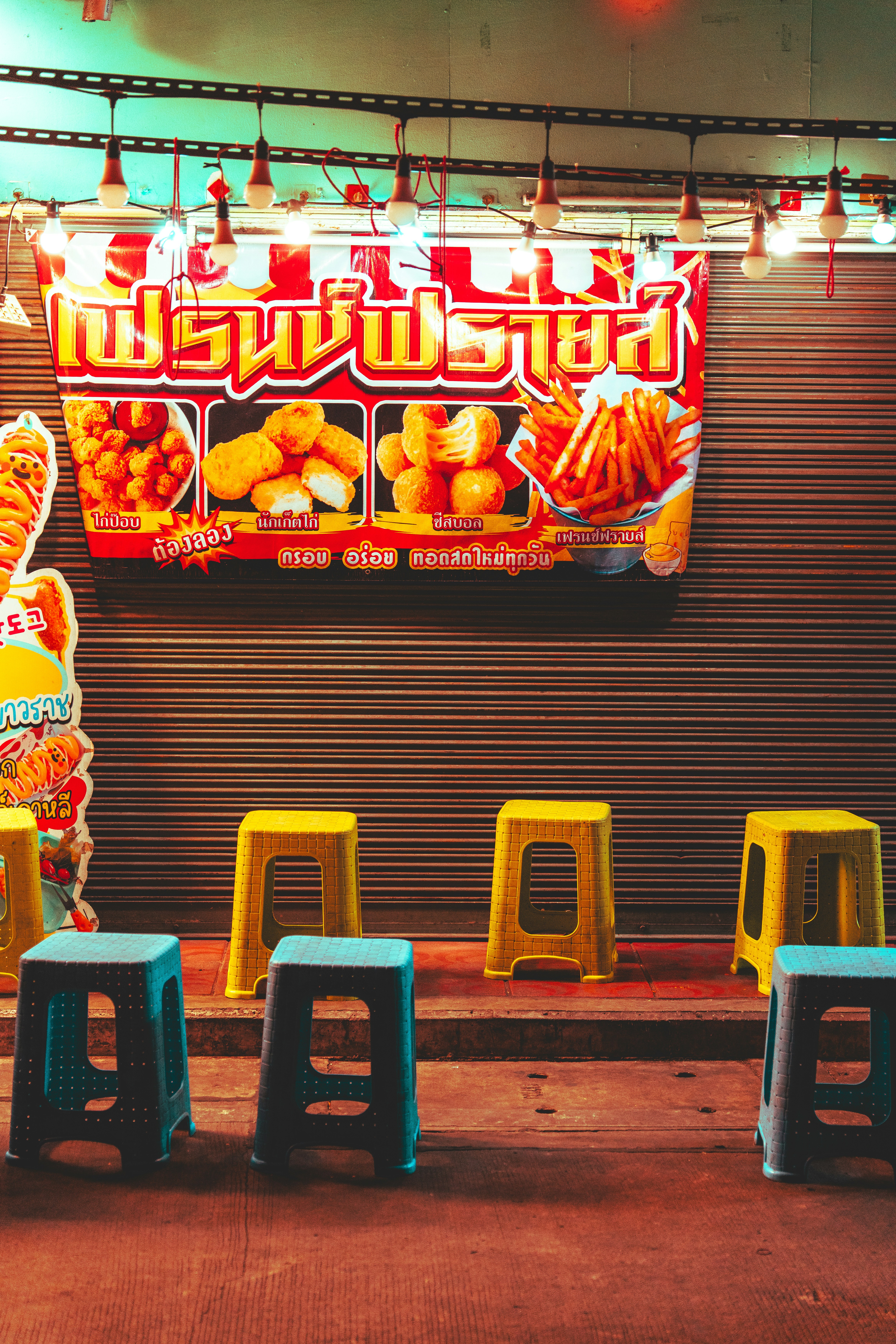 Colorful Night Snack Stand Under Neon Glow