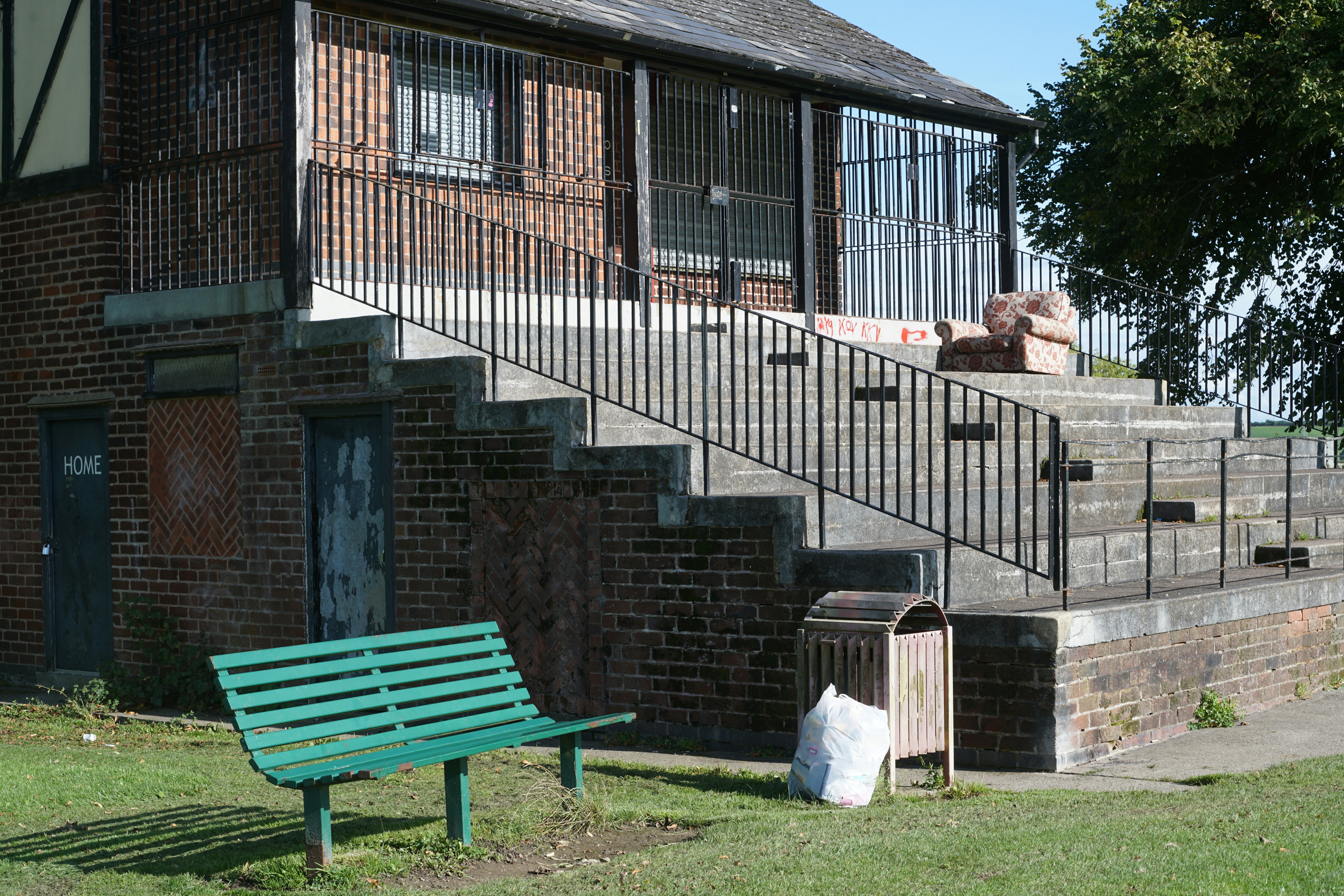 Brick Staircase Overlooking the Park with a Sea-green Bench