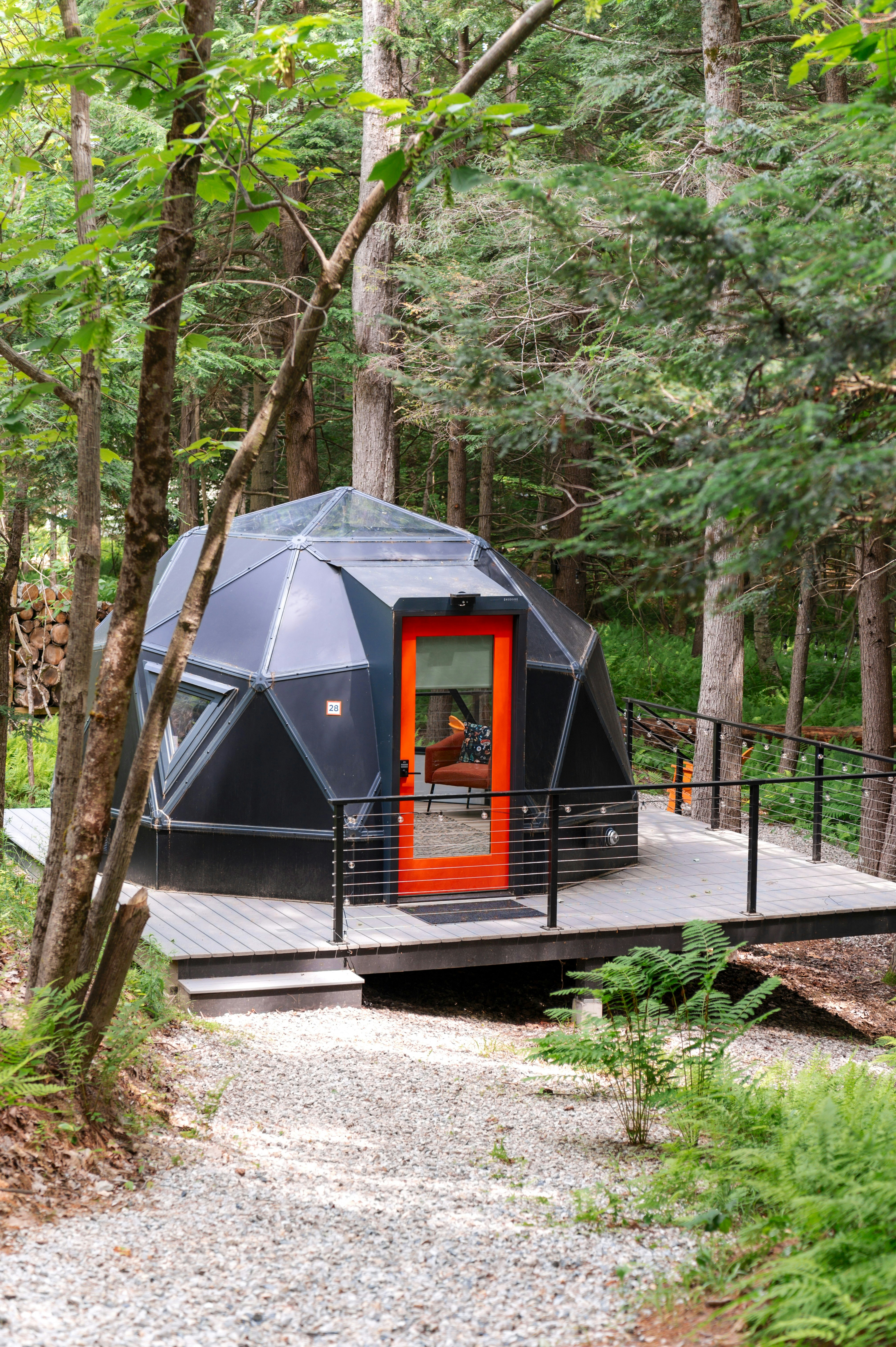 Geodesic Dome Retreat Amid Forest Greens