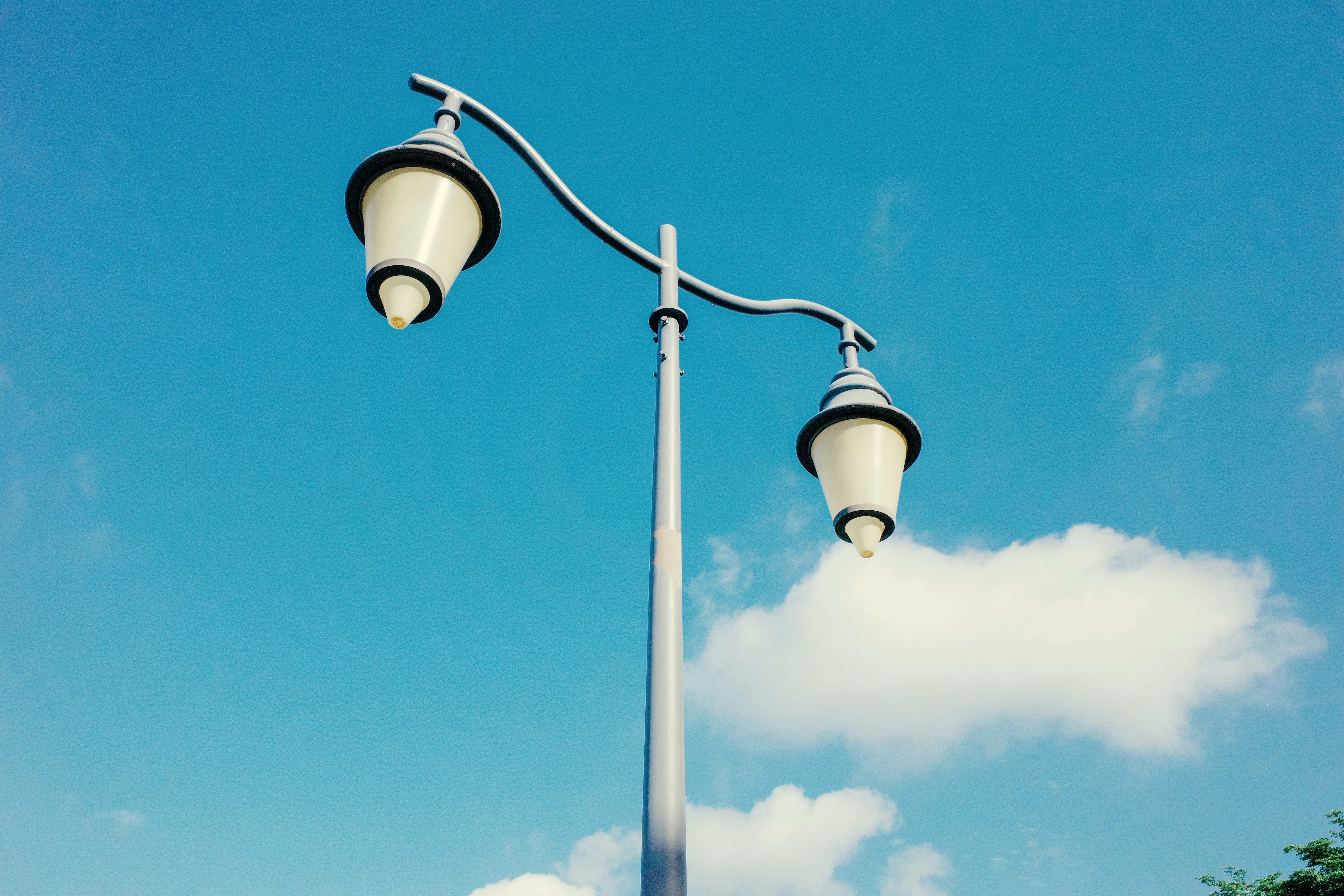 Twin Lanterns Against a Clear Blue Sky