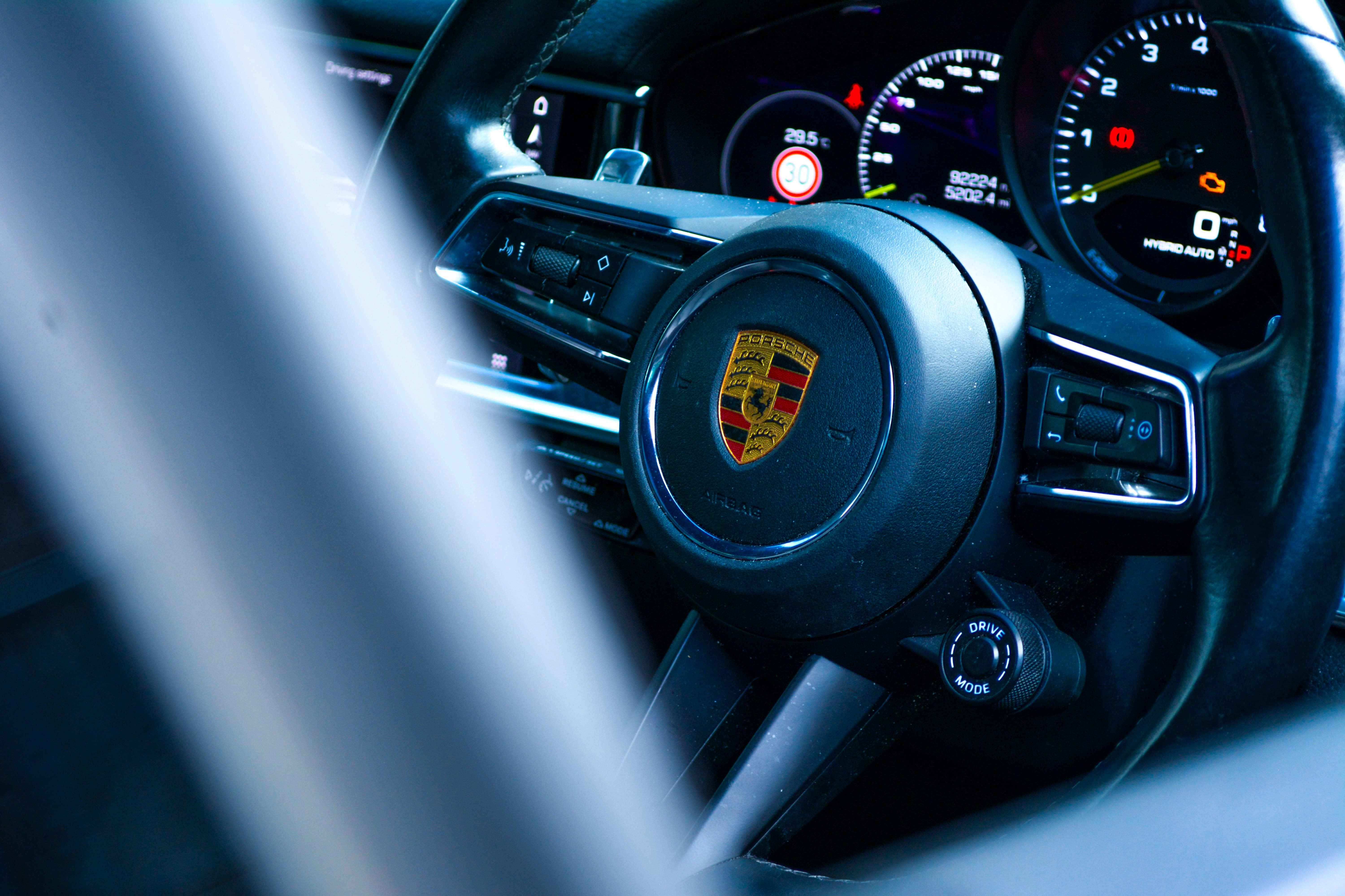 Steering toward Precision: Porsche Crest on a Momentary Stare