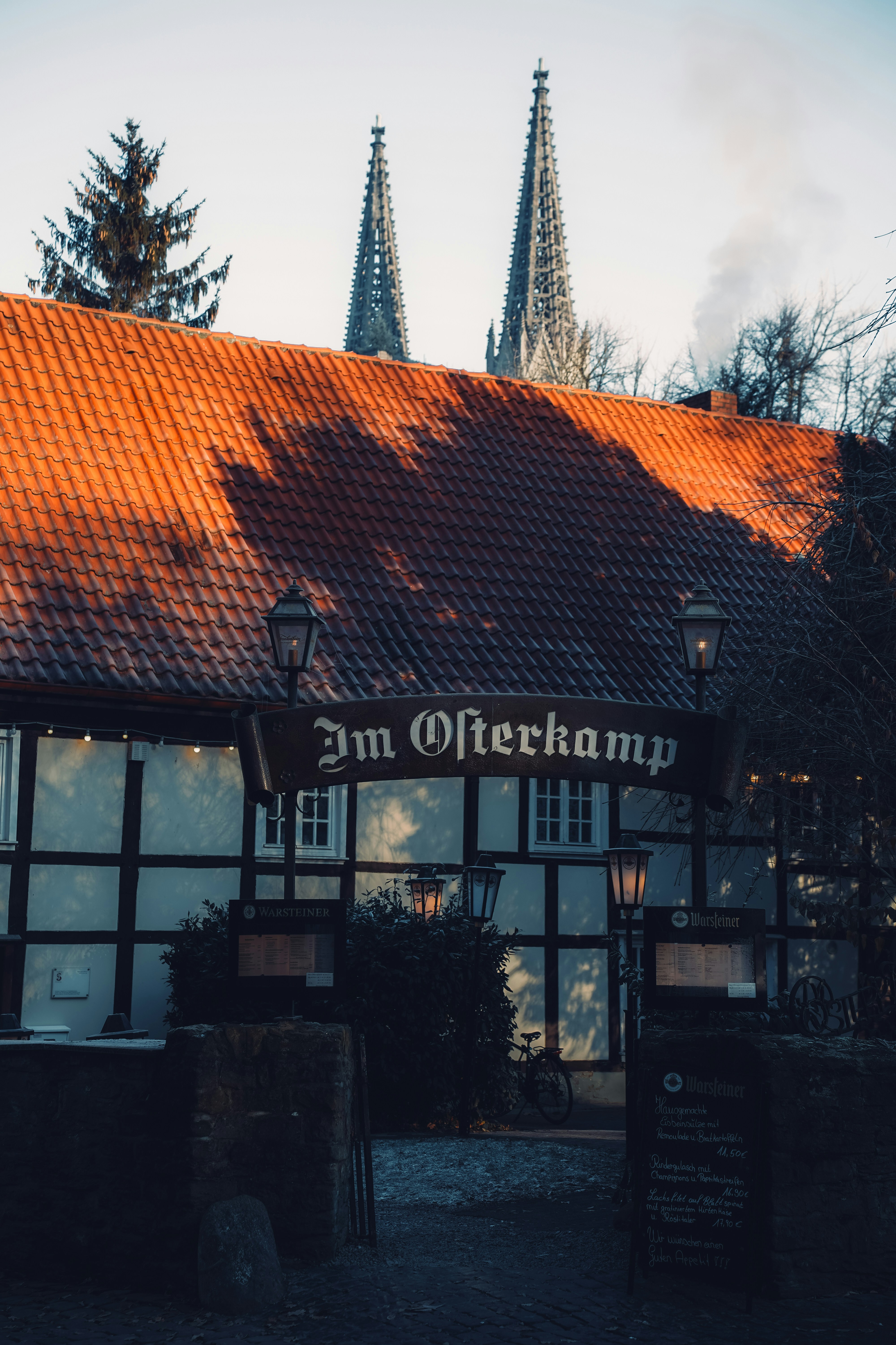 Timber-Framed Inn Gate Under Warm Tiled Roof