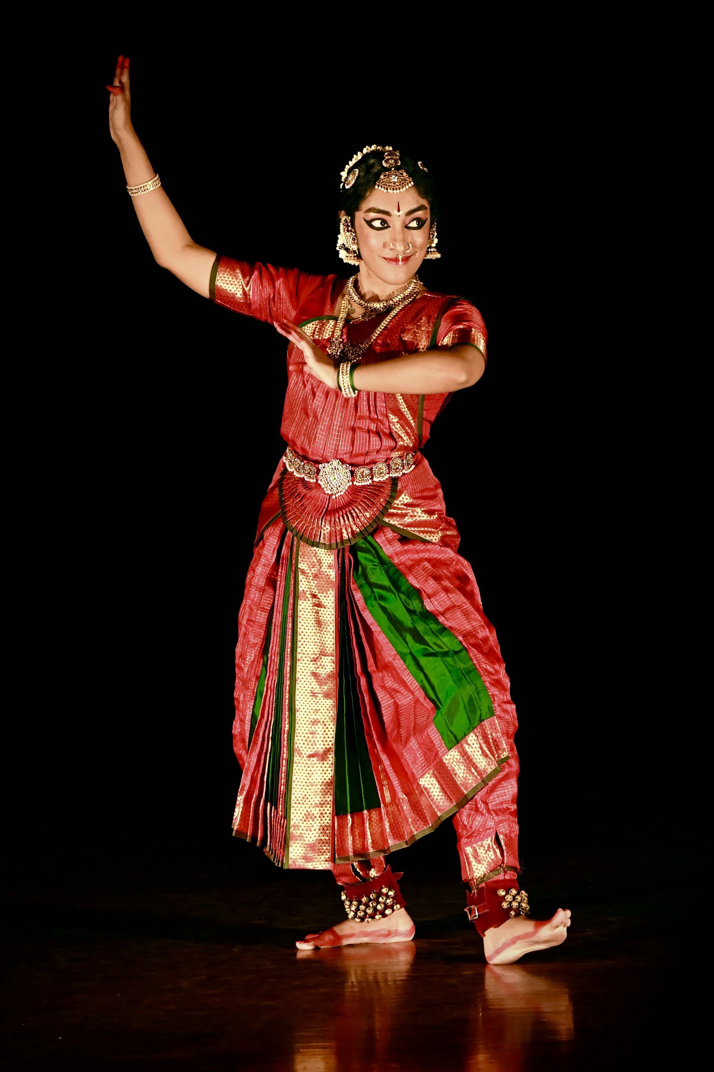 Red-clad Bharatanatyam Dancer in Silhouette
