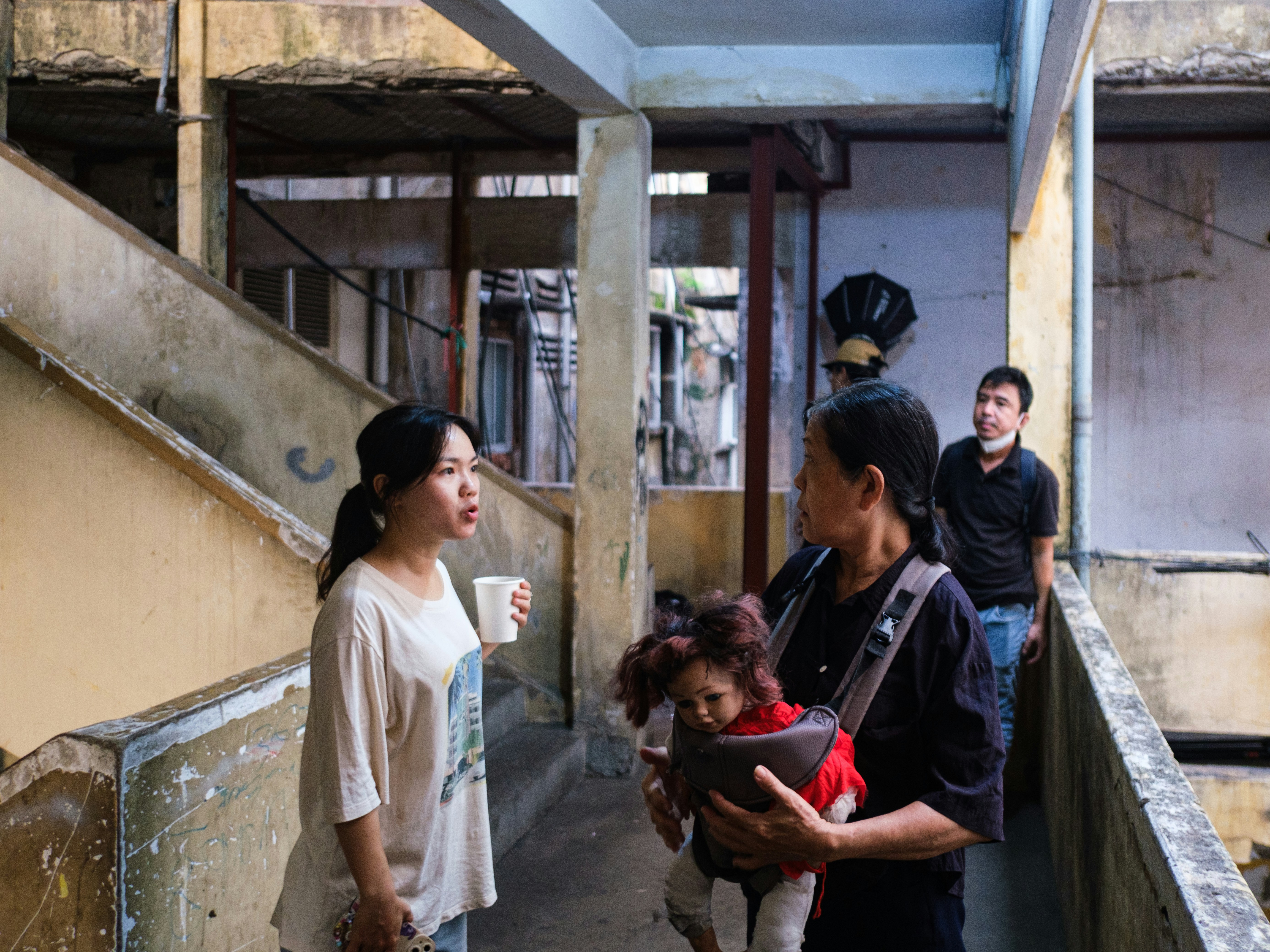 Conversations in the Stairs: A Moment on the Industrial Corridor