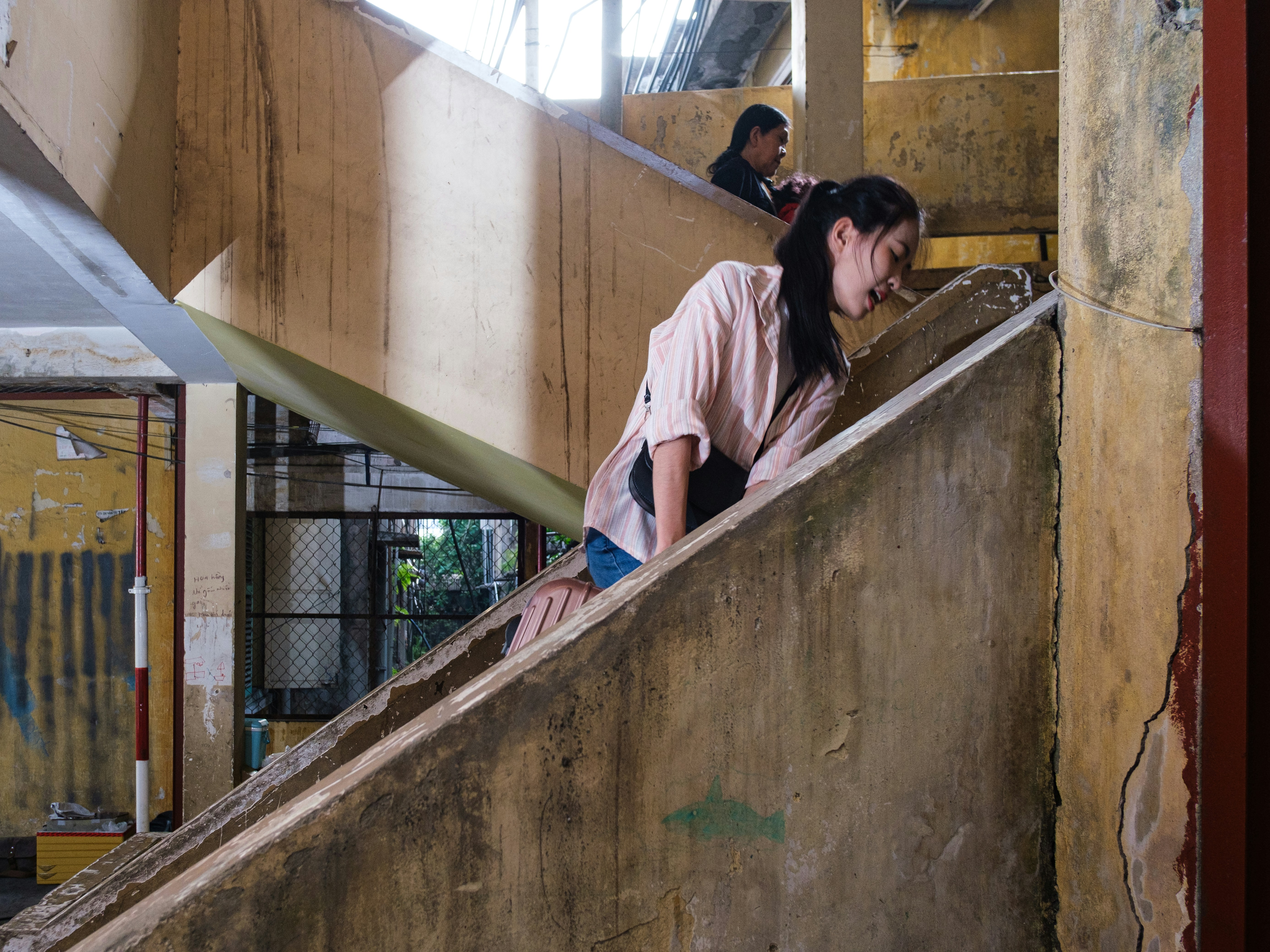 Industrial Staircase Quietly Reveals a Moment of Curiosity