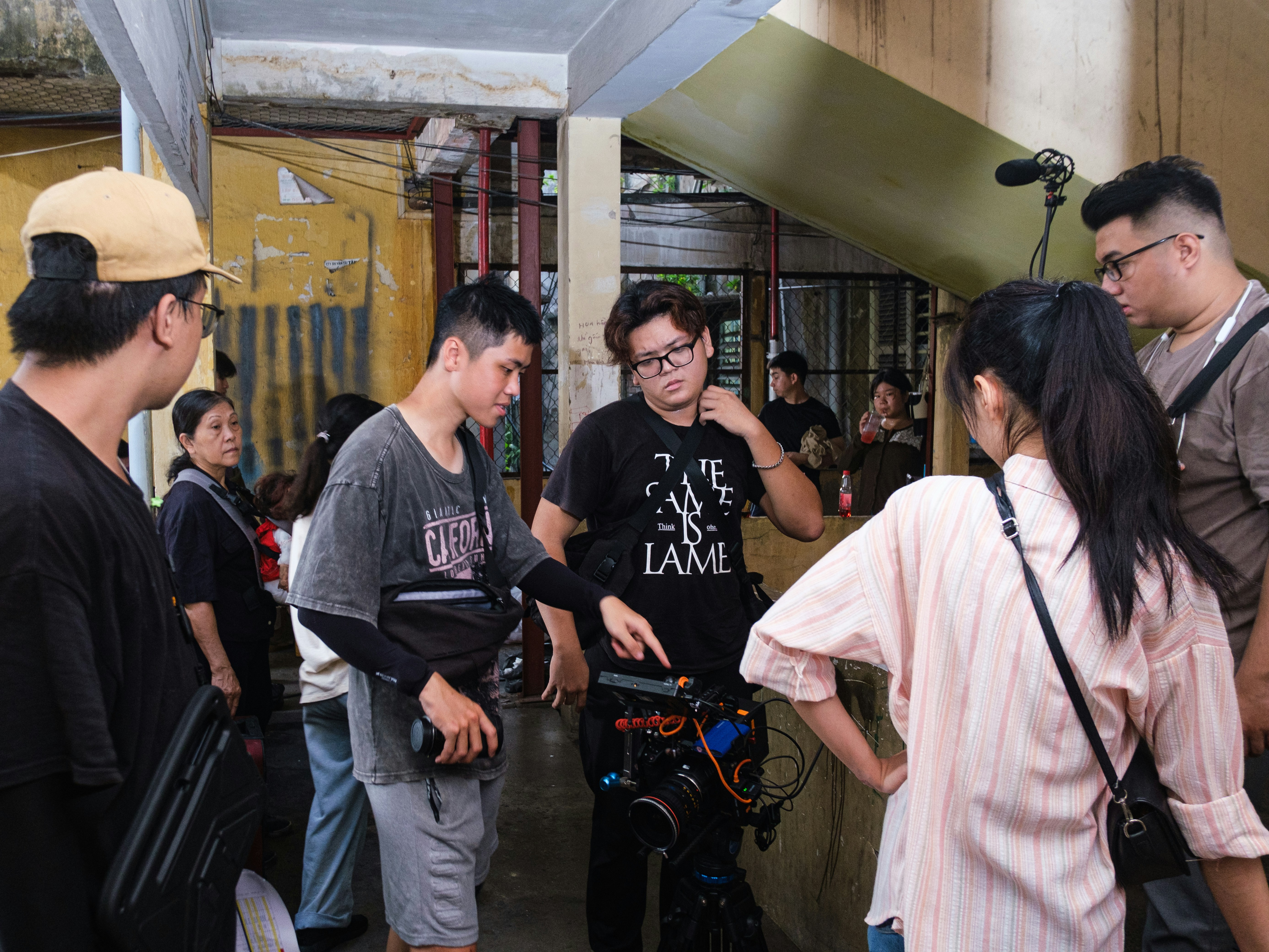 Crew Call in a Bustling Studio Corridor