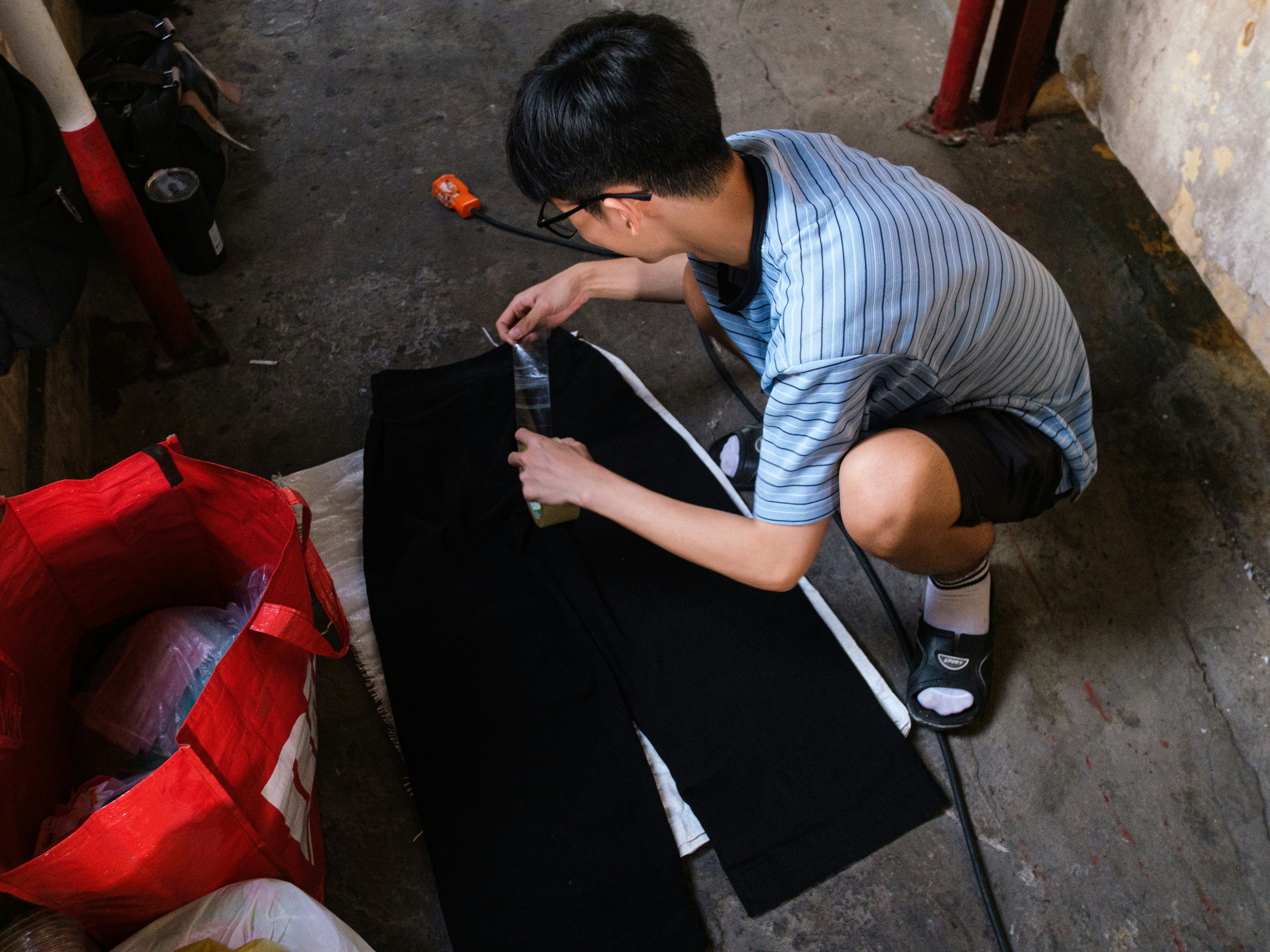 Cutting Tailor’s Craft: A Youth Seams Through a Hidden Workshop