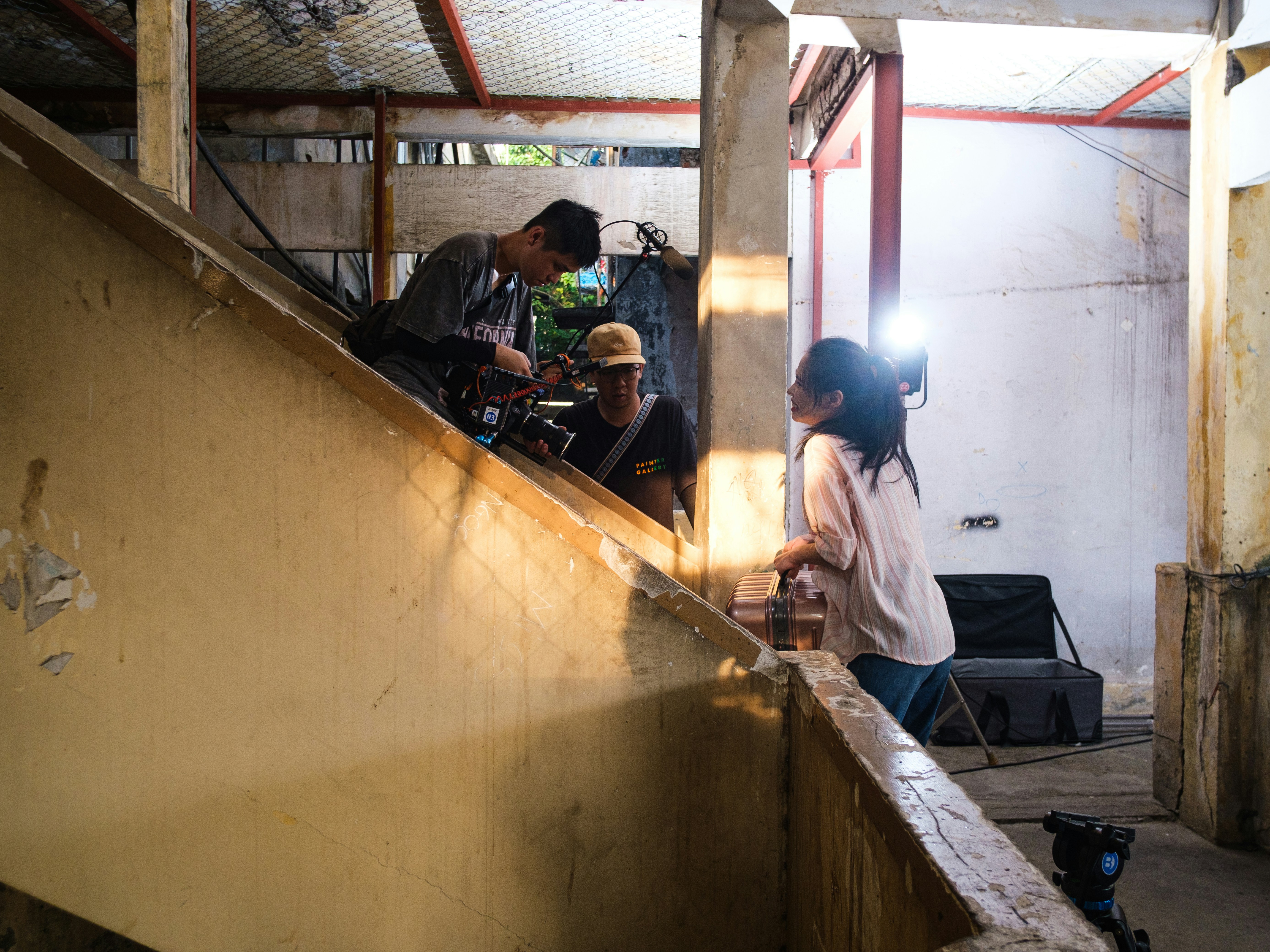 Crew on the Ramp: Filmmaking in a Sunlit Workshop