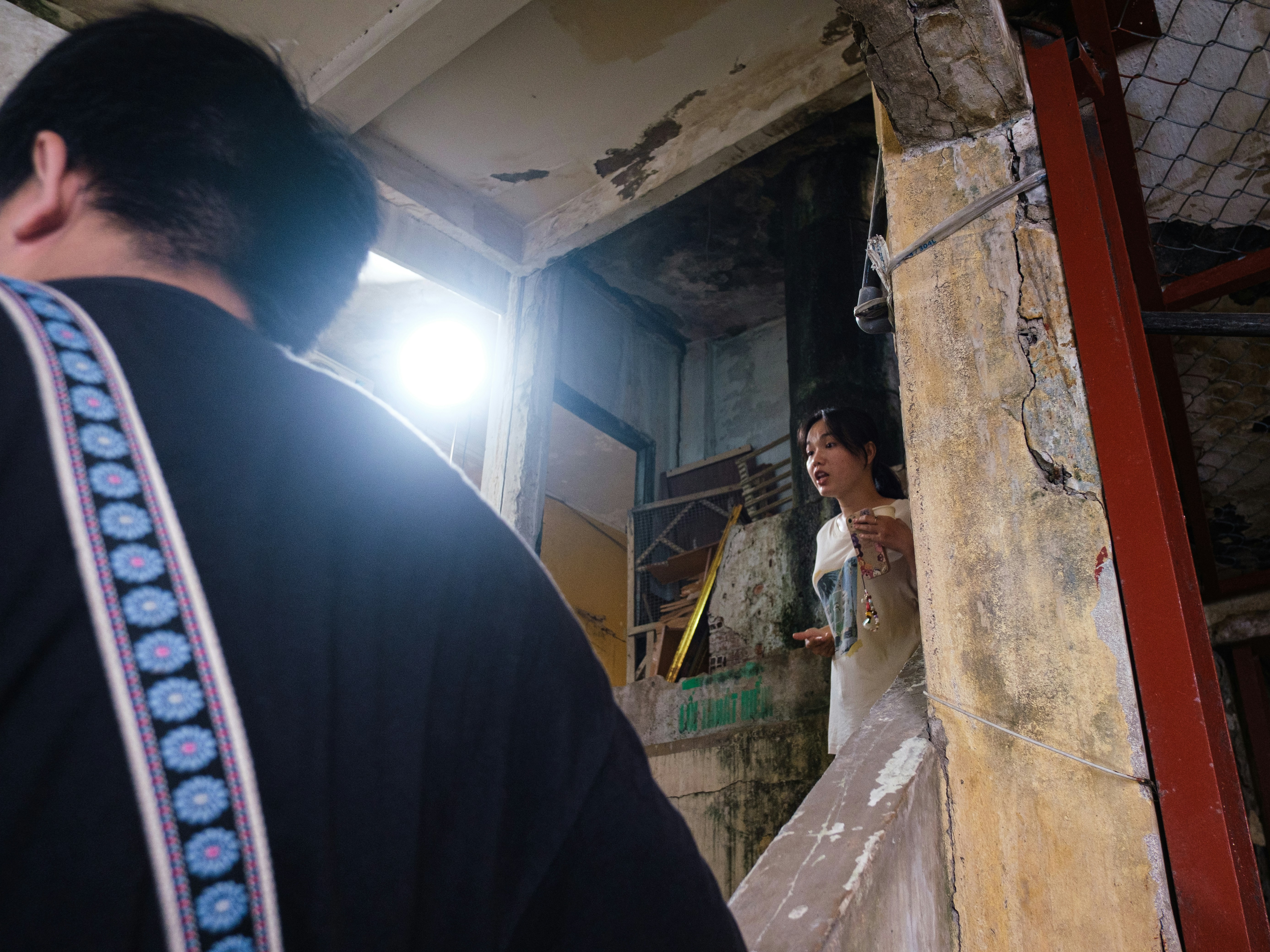 Hidden Bride in a Crumbling Hallway