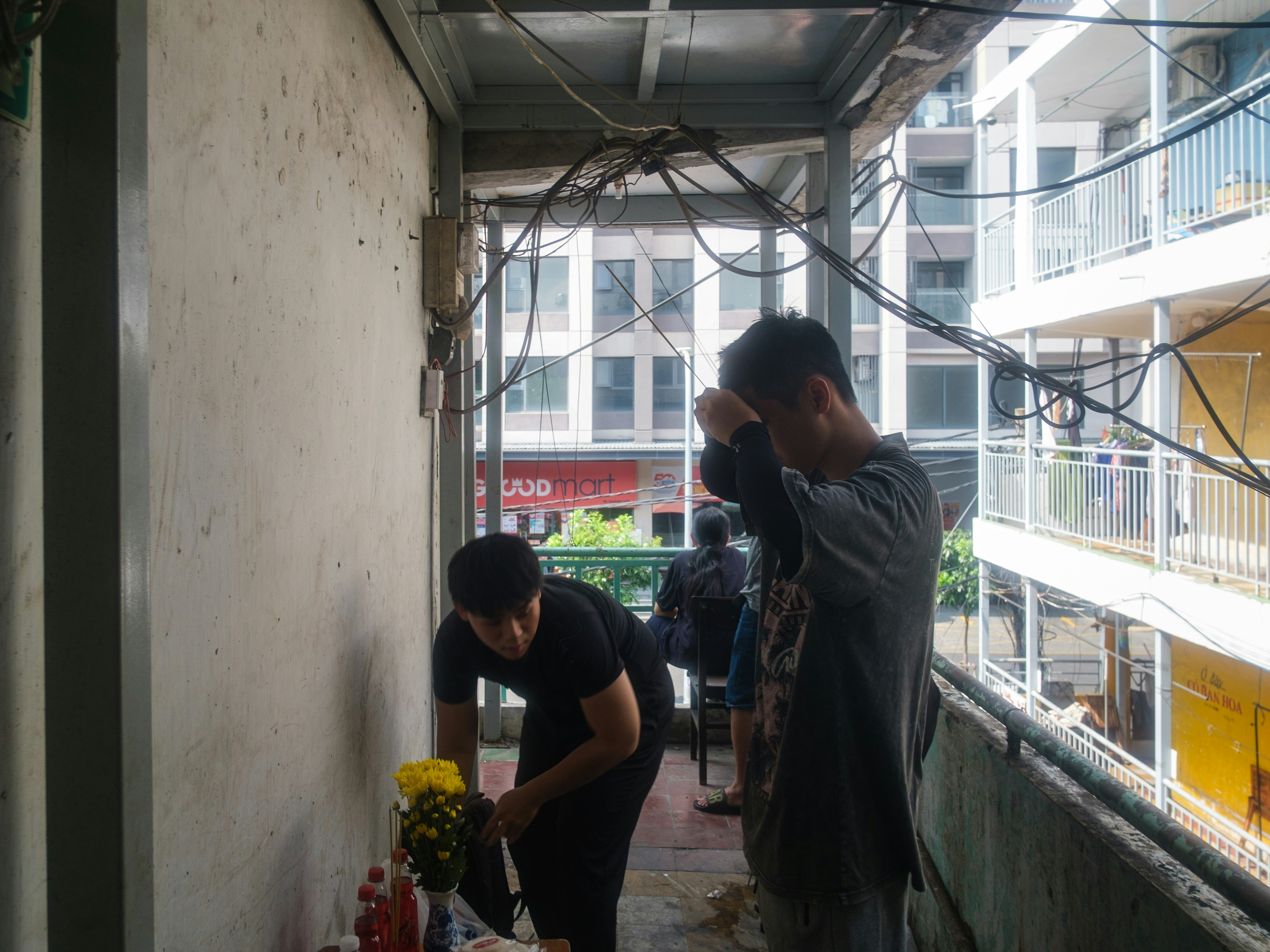 Workshop in Progress: A Moment with Fresh Flowers on a Concrete Balcony
