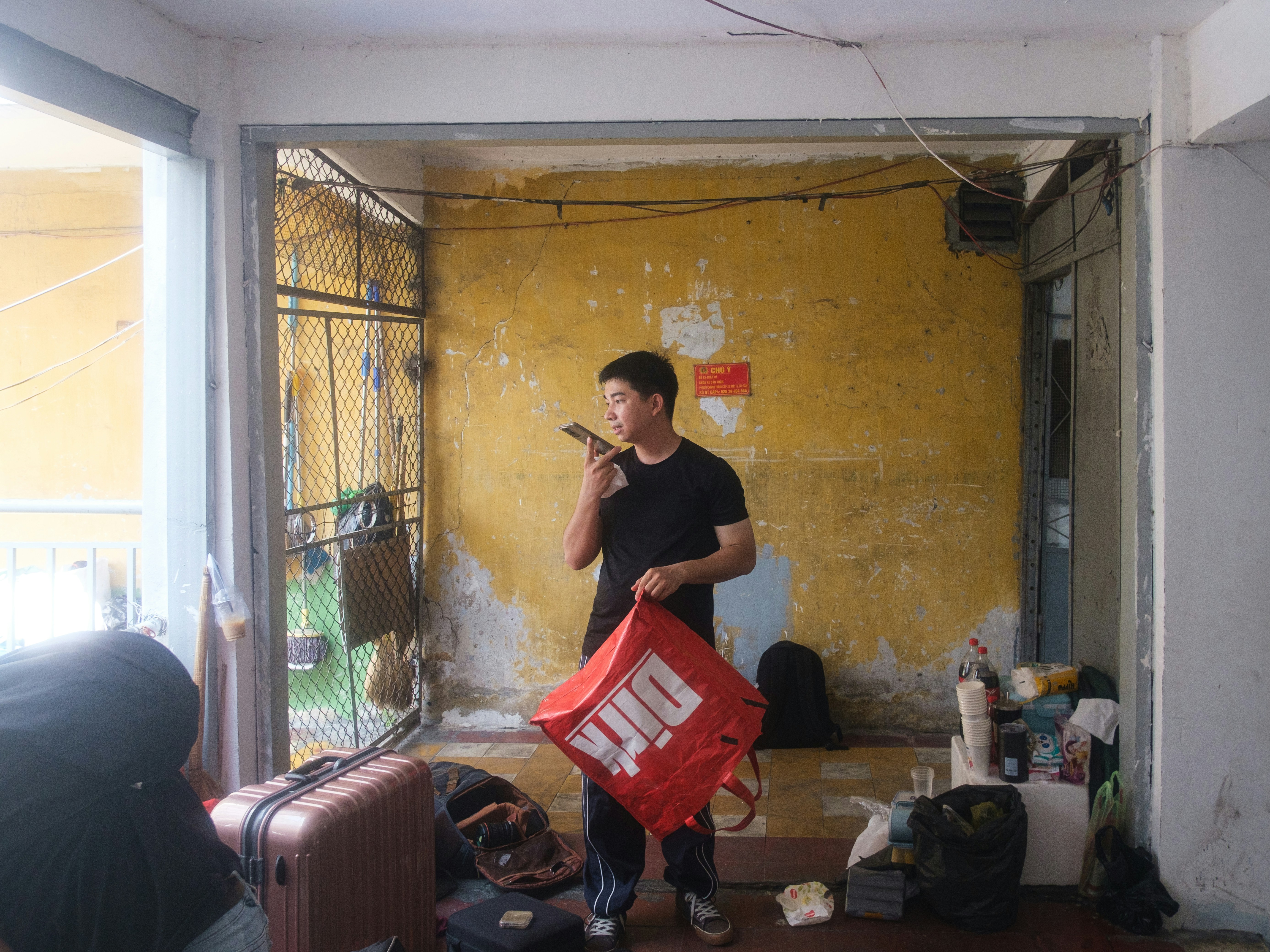 A Quiet Moment of Preparation in a Rough-Edge Corridor