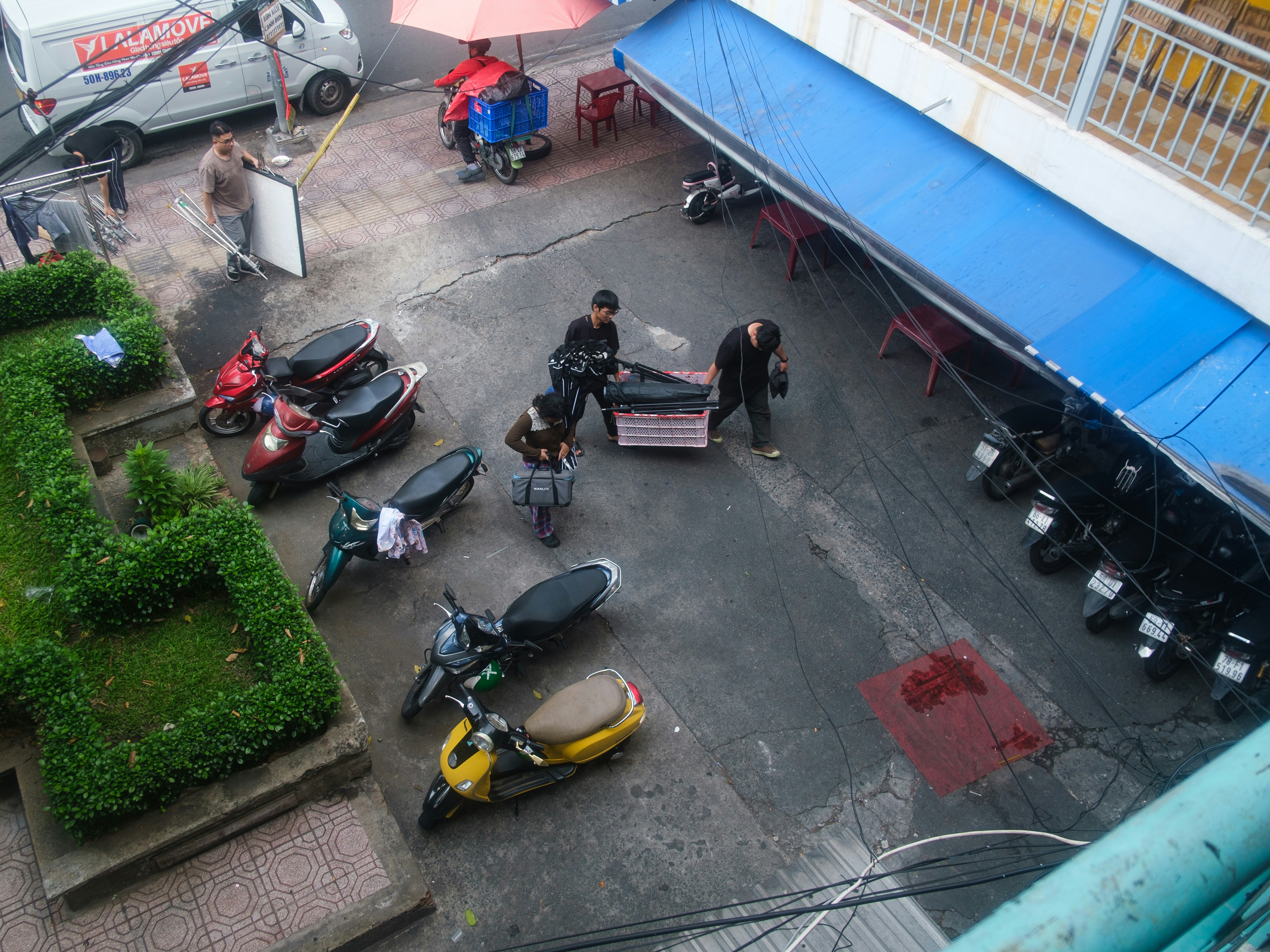 Market Courtyard Shuffle: Scooters, Vendors, and a Tiled Path