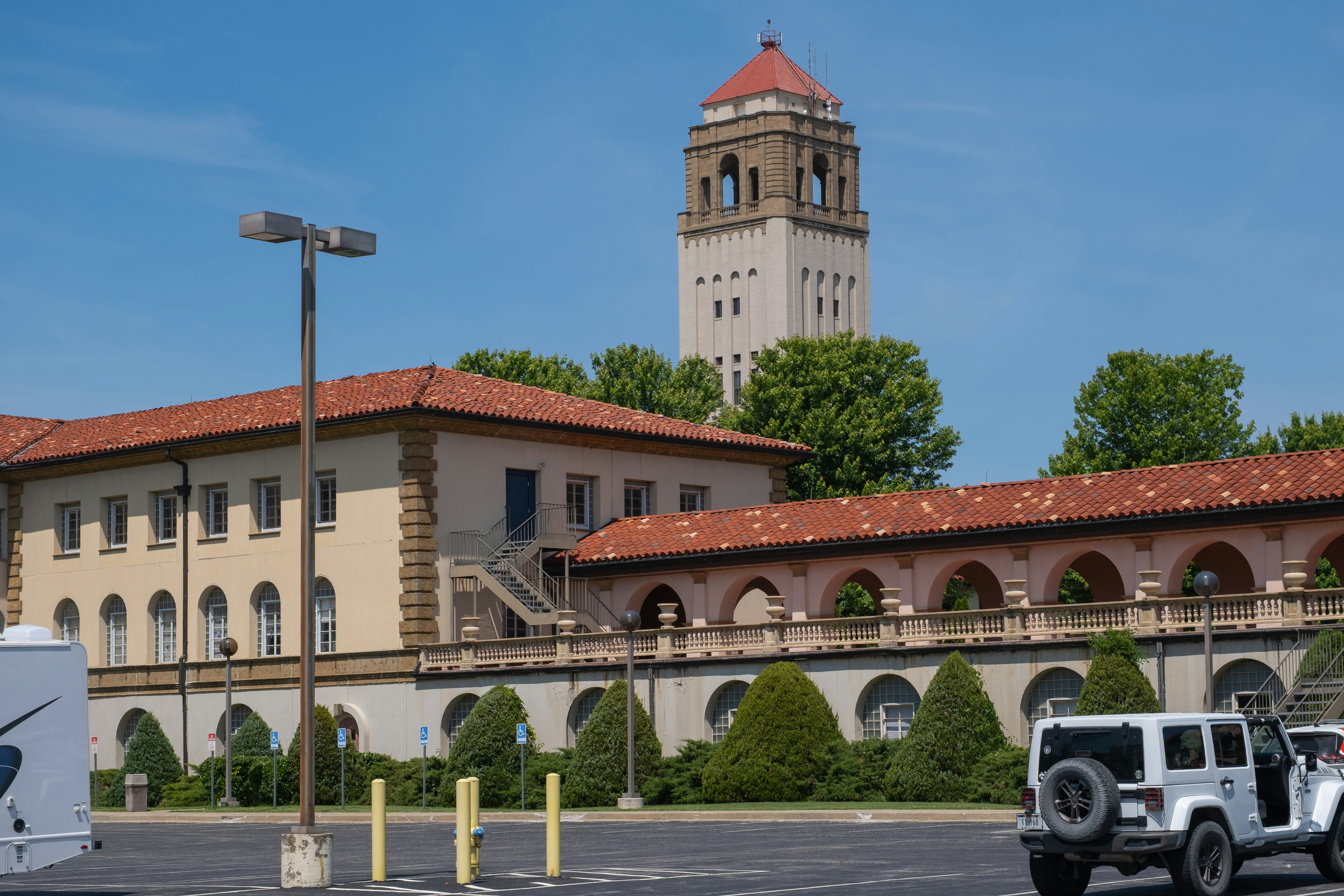 Court Campus Clocktower Rising Above Colonnaded Gallery