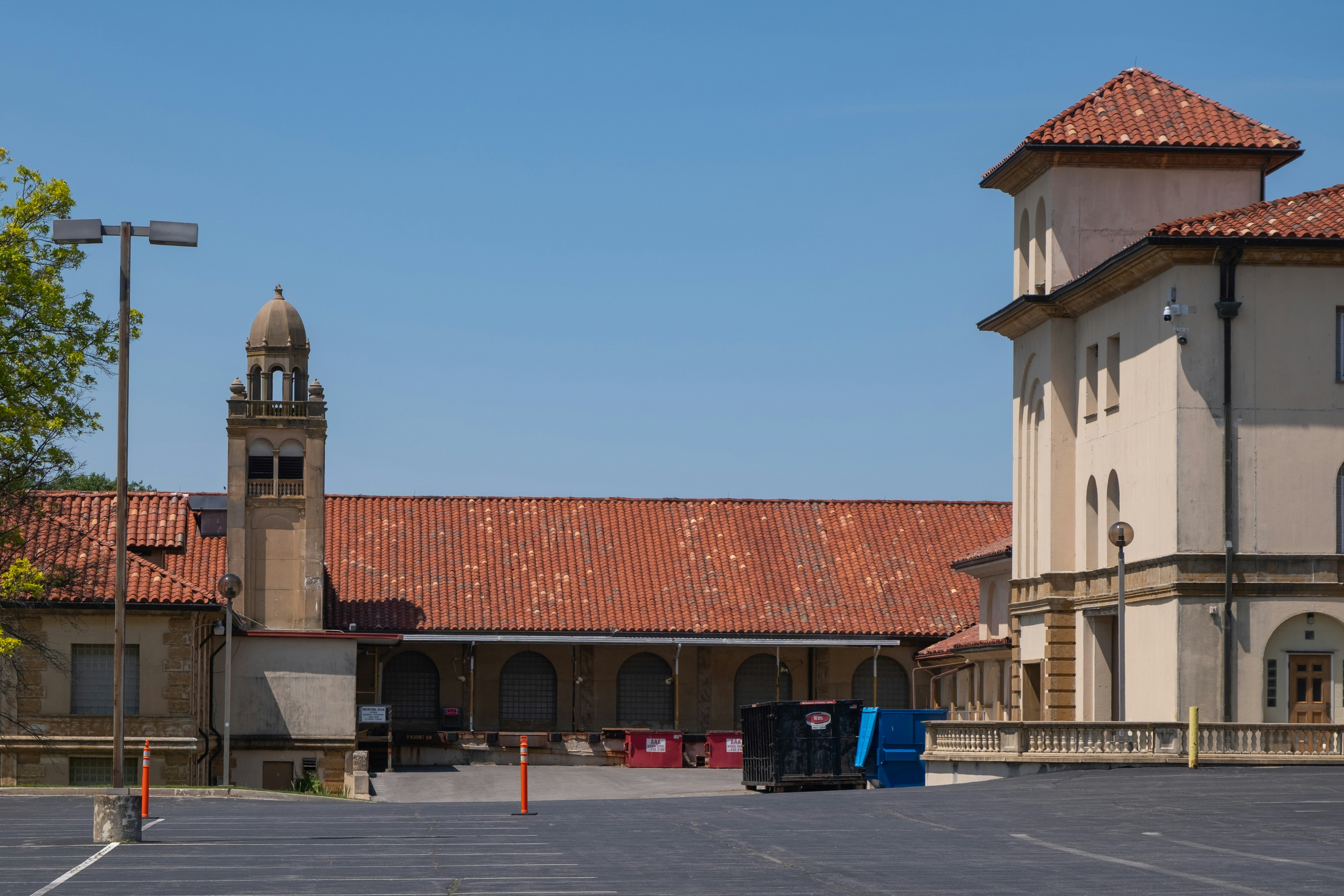 Courtyard Vista: Red-Tiled Facades and Quiet Archive