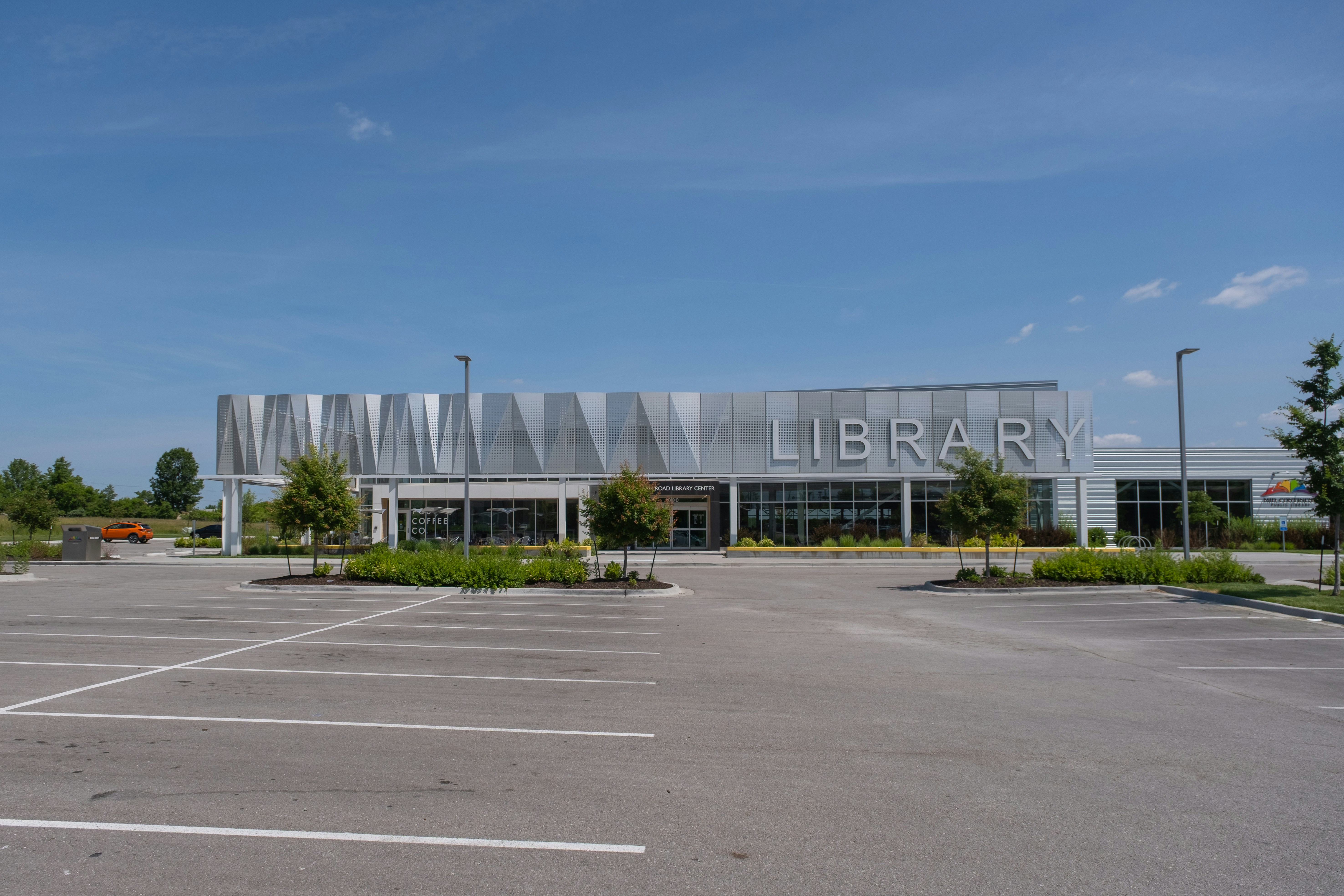 Library Facade in Morning Light with Geometric Metalwork