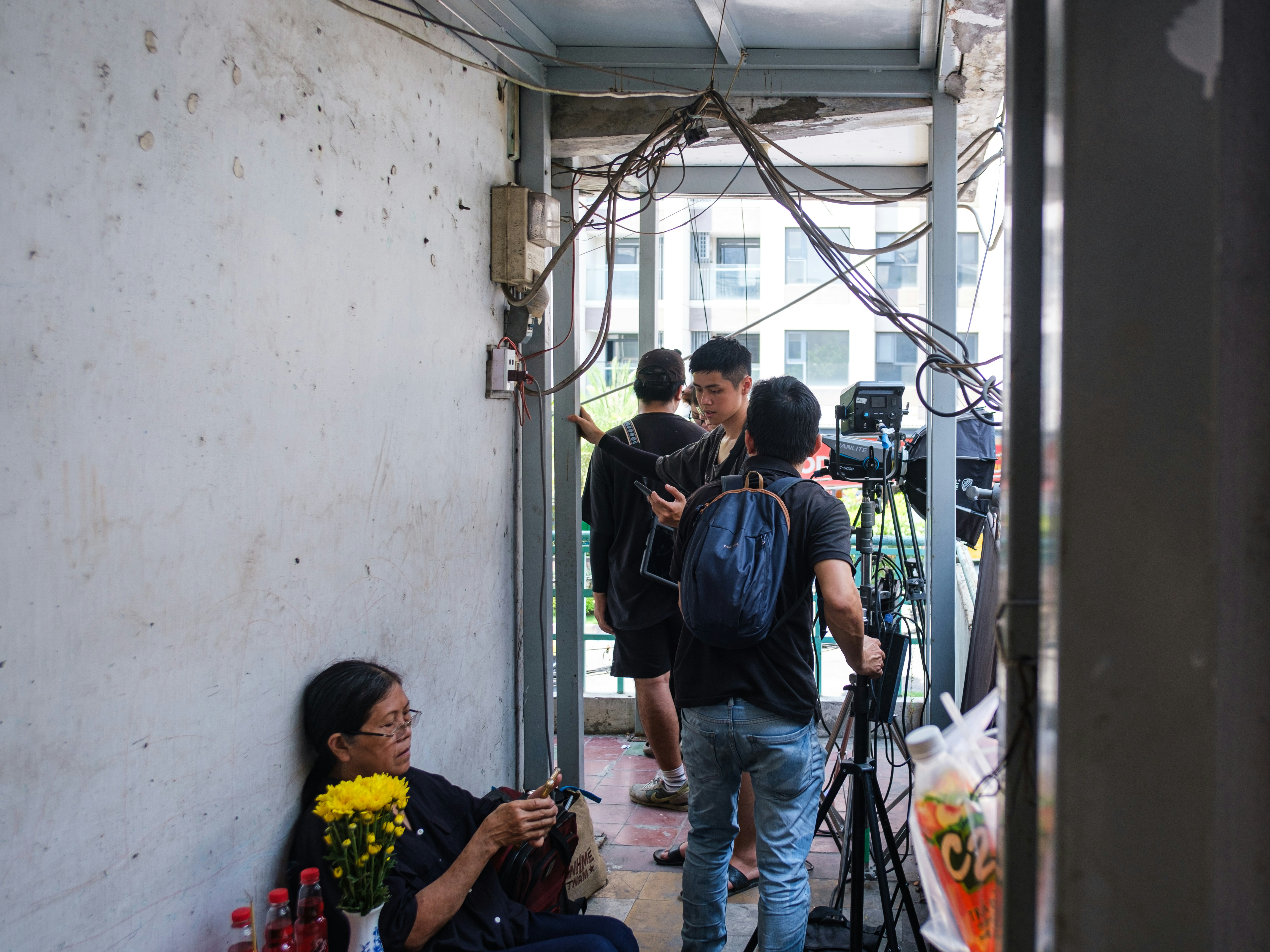 Crew Break in the Quiet Corridor: Behind the Scenes of a Shoot