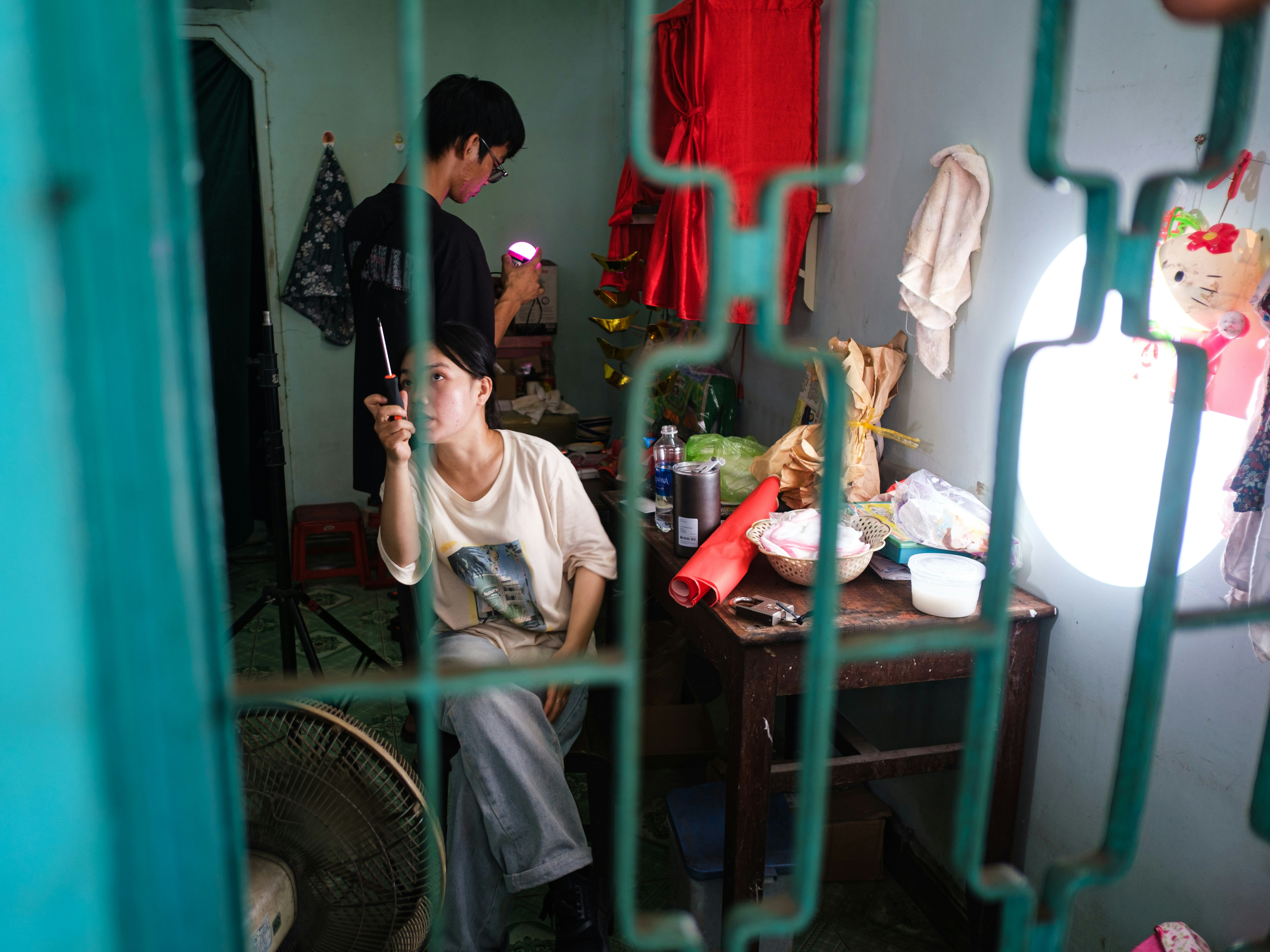 Attention Behind the Grille: A Quiet Moment in a Busy Room