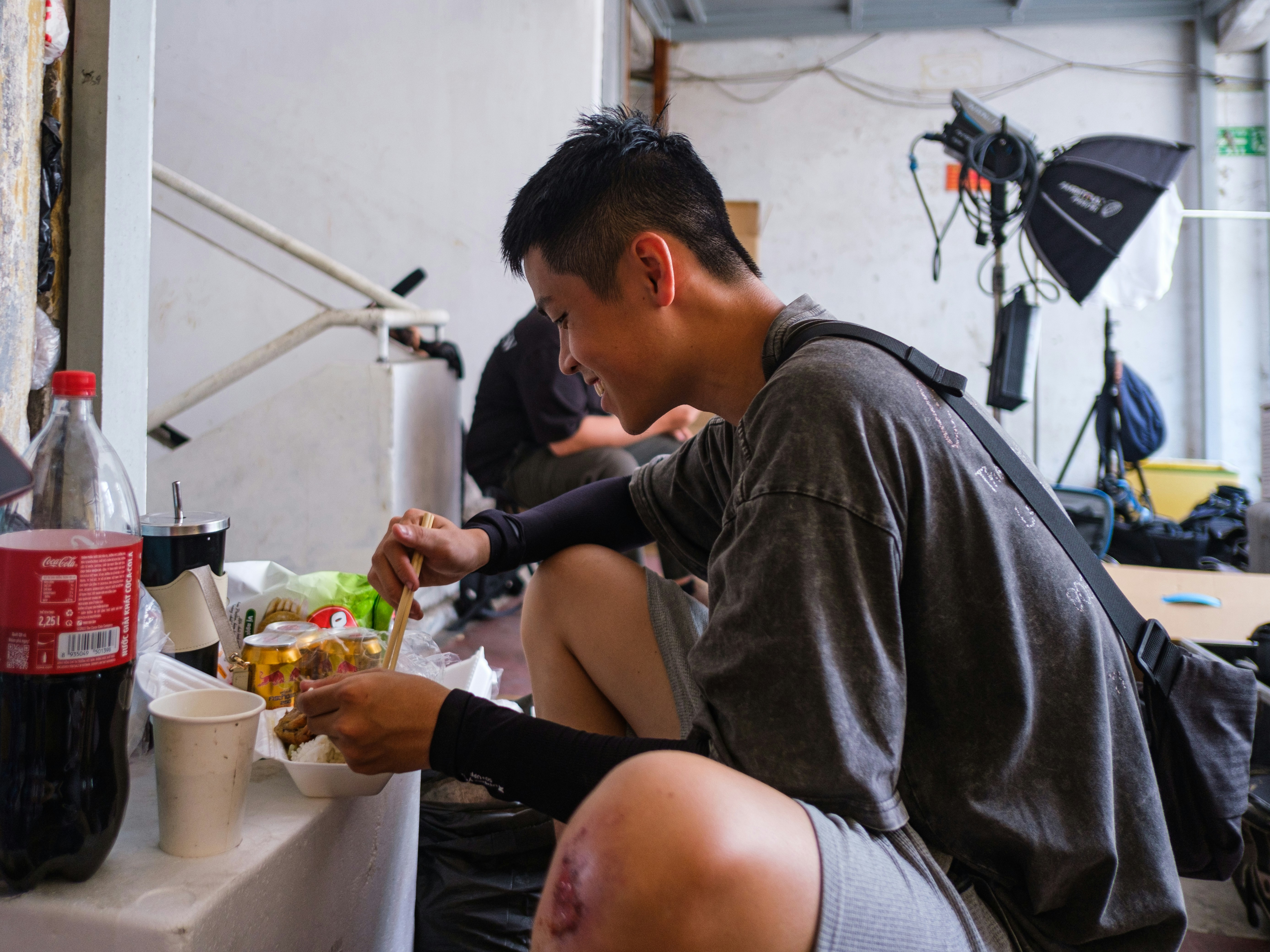 Behind-the-Scenes Snack Break: Focused Moment in a Studio Run-through