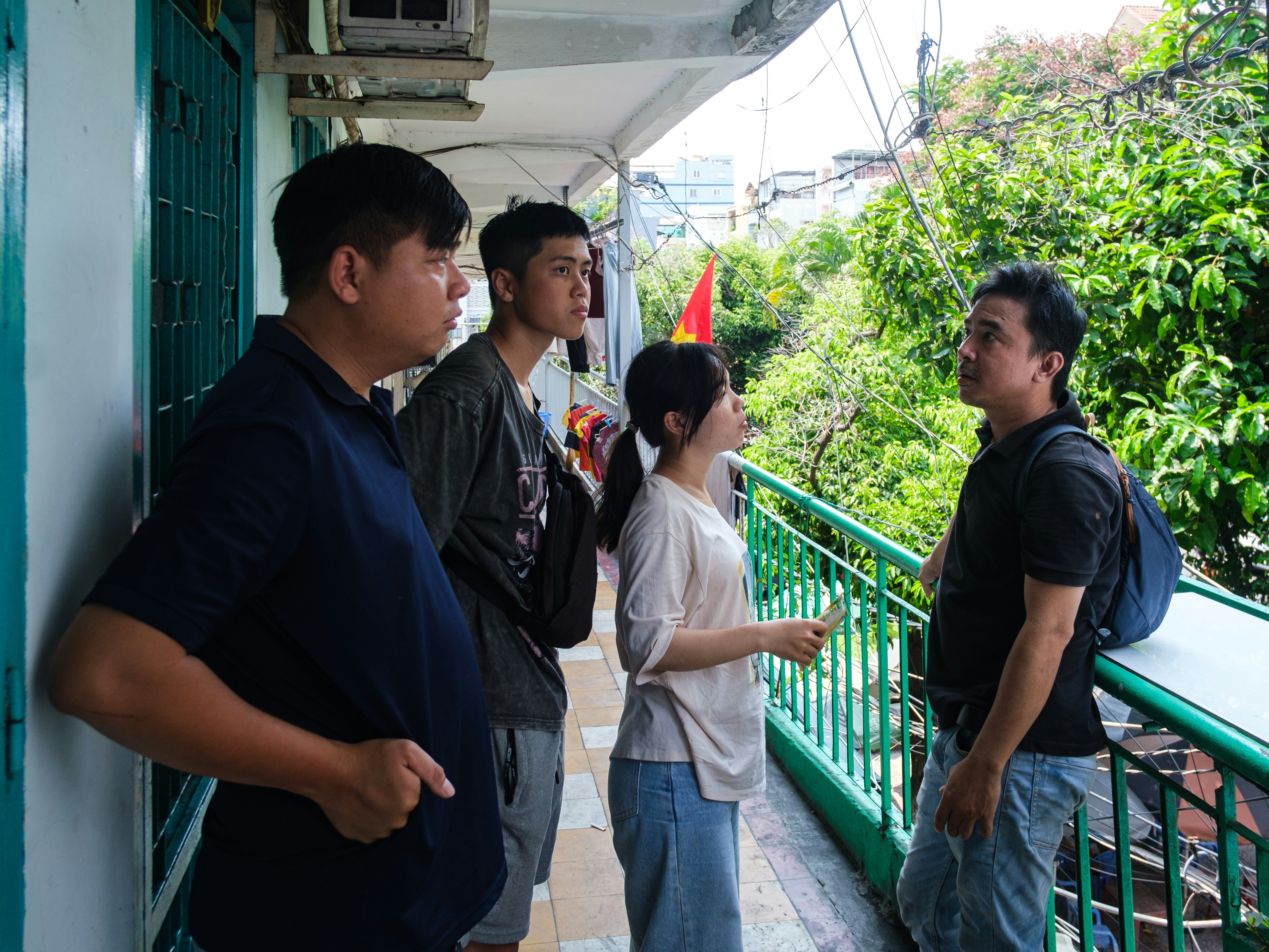 Conversations on the Balcony: A Moment of Showtime in a Quiet Corridor