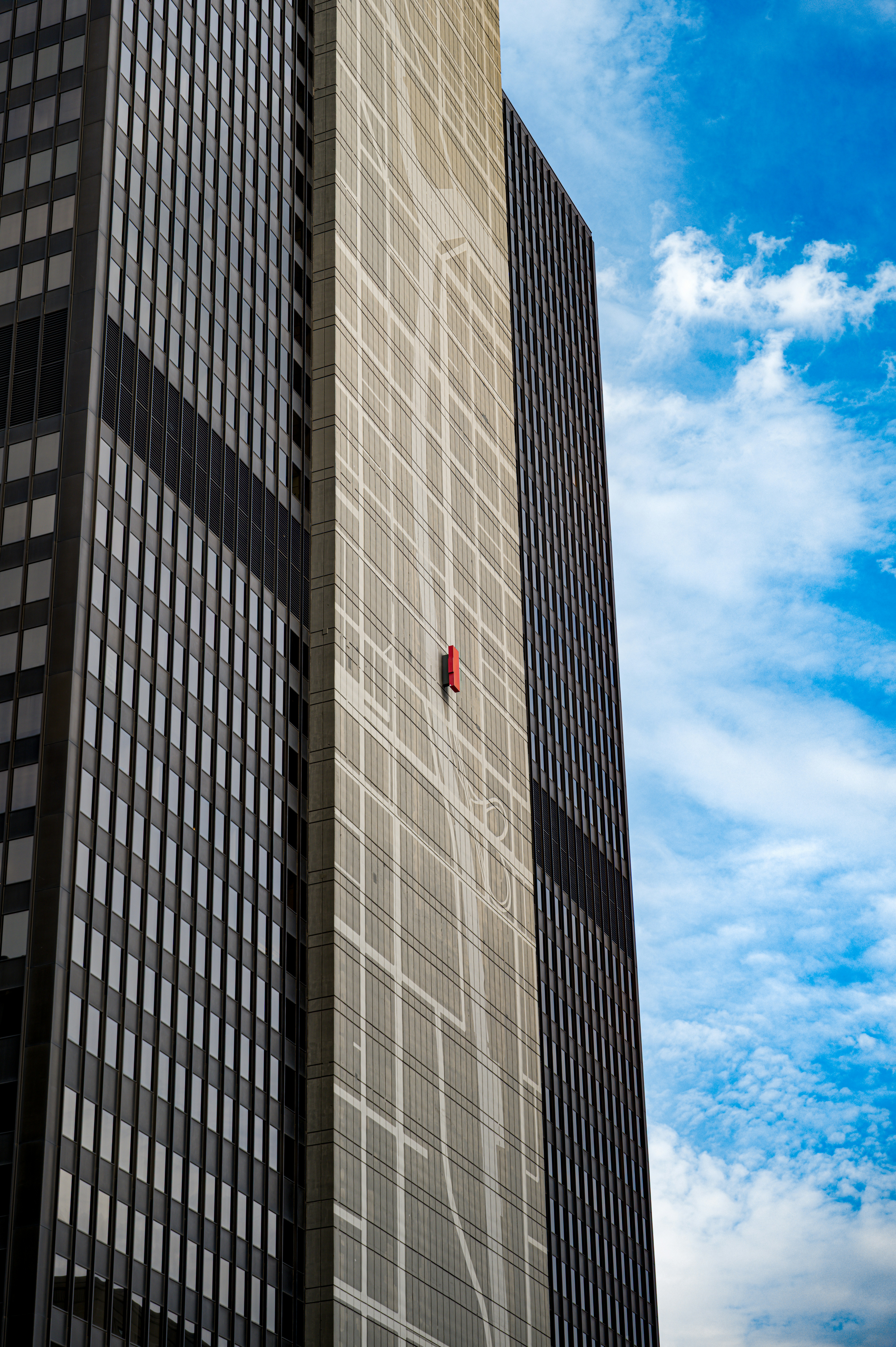 Vertical Monoliths Under a Blue Sky