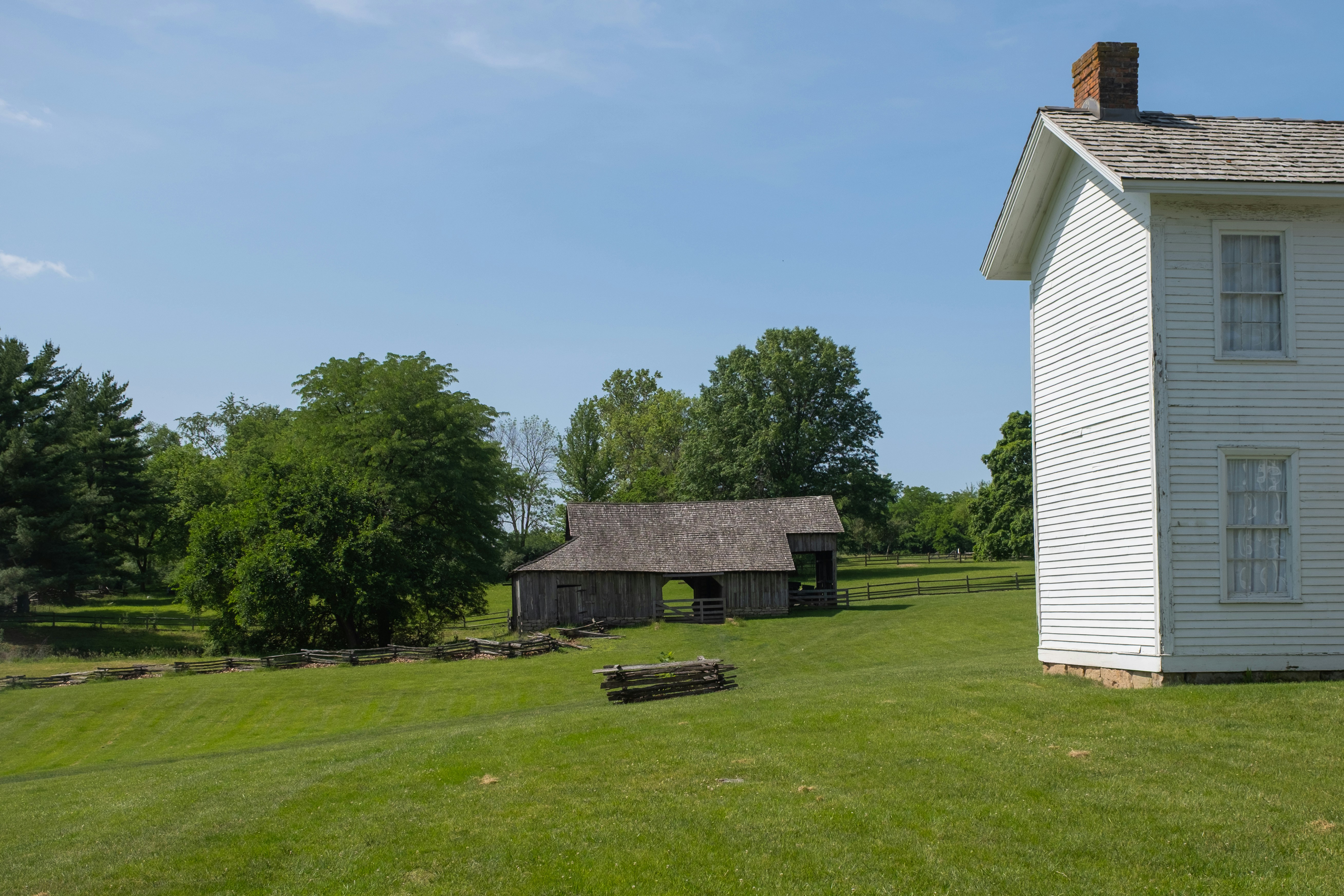 White House on the Right, Open Field and Barn in Distant Pasture