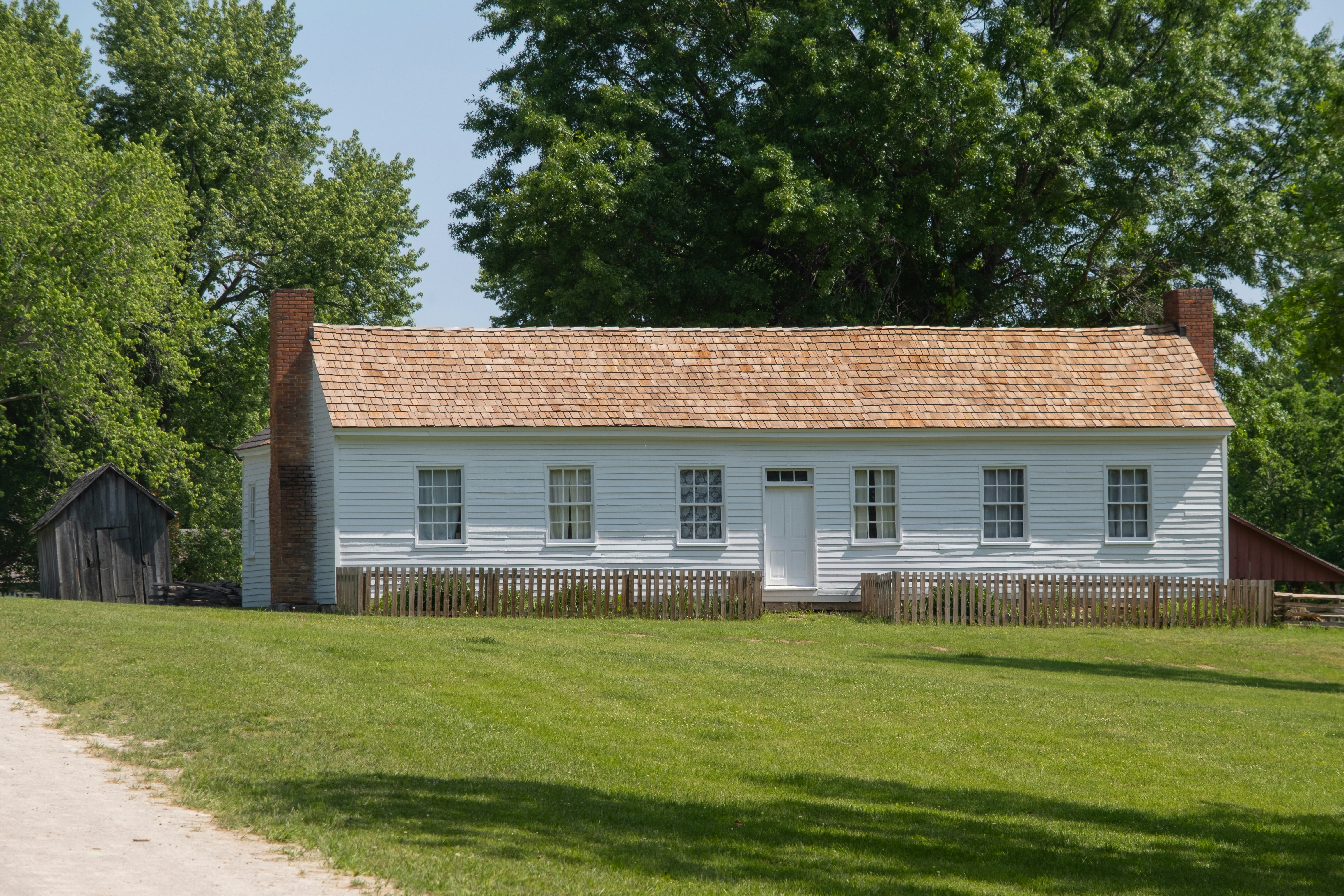 Quiet White Cottage on a Sunlit Ridge