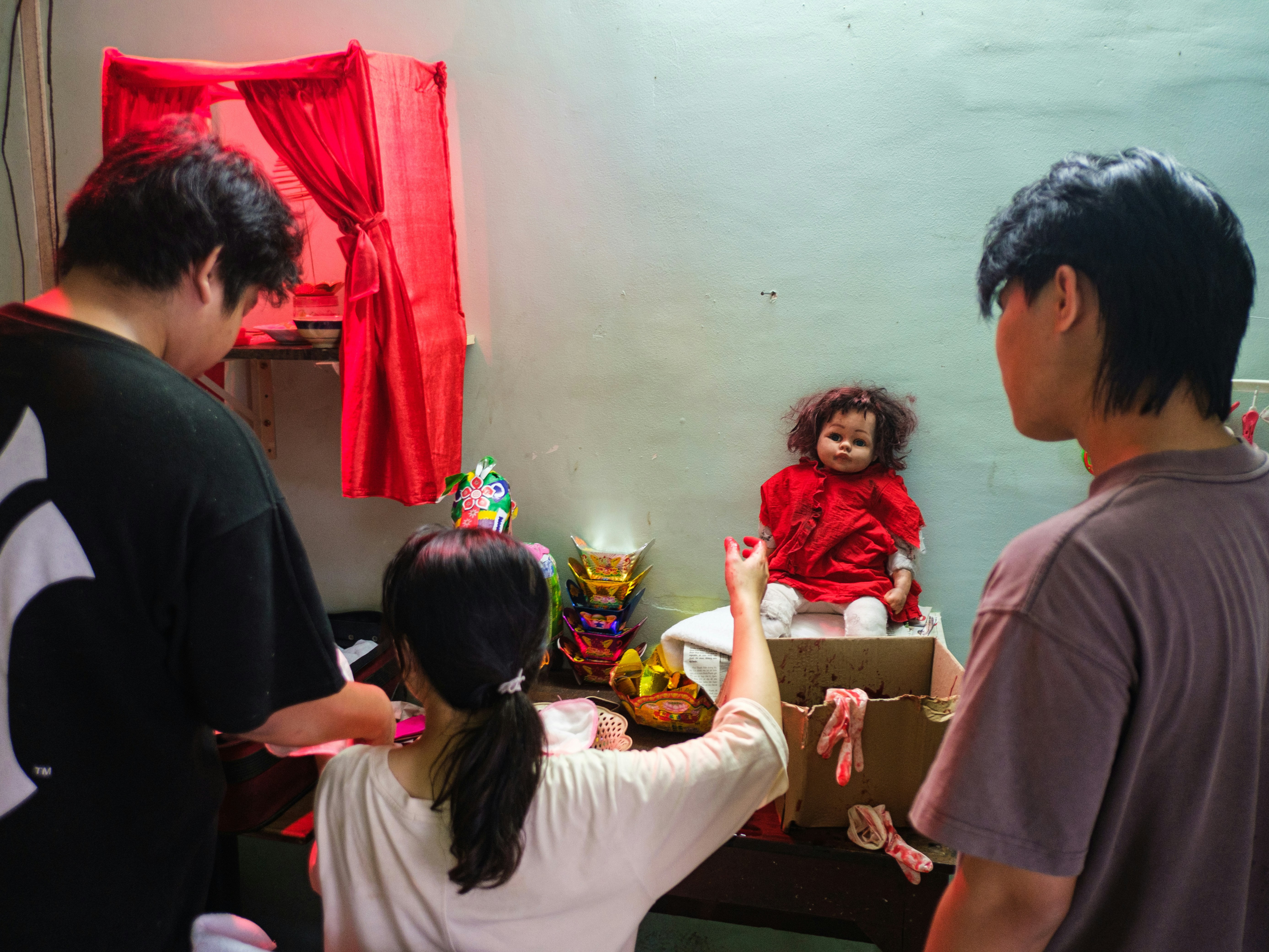 Doll in the Center: A Family Gathering Around a Curious Toy