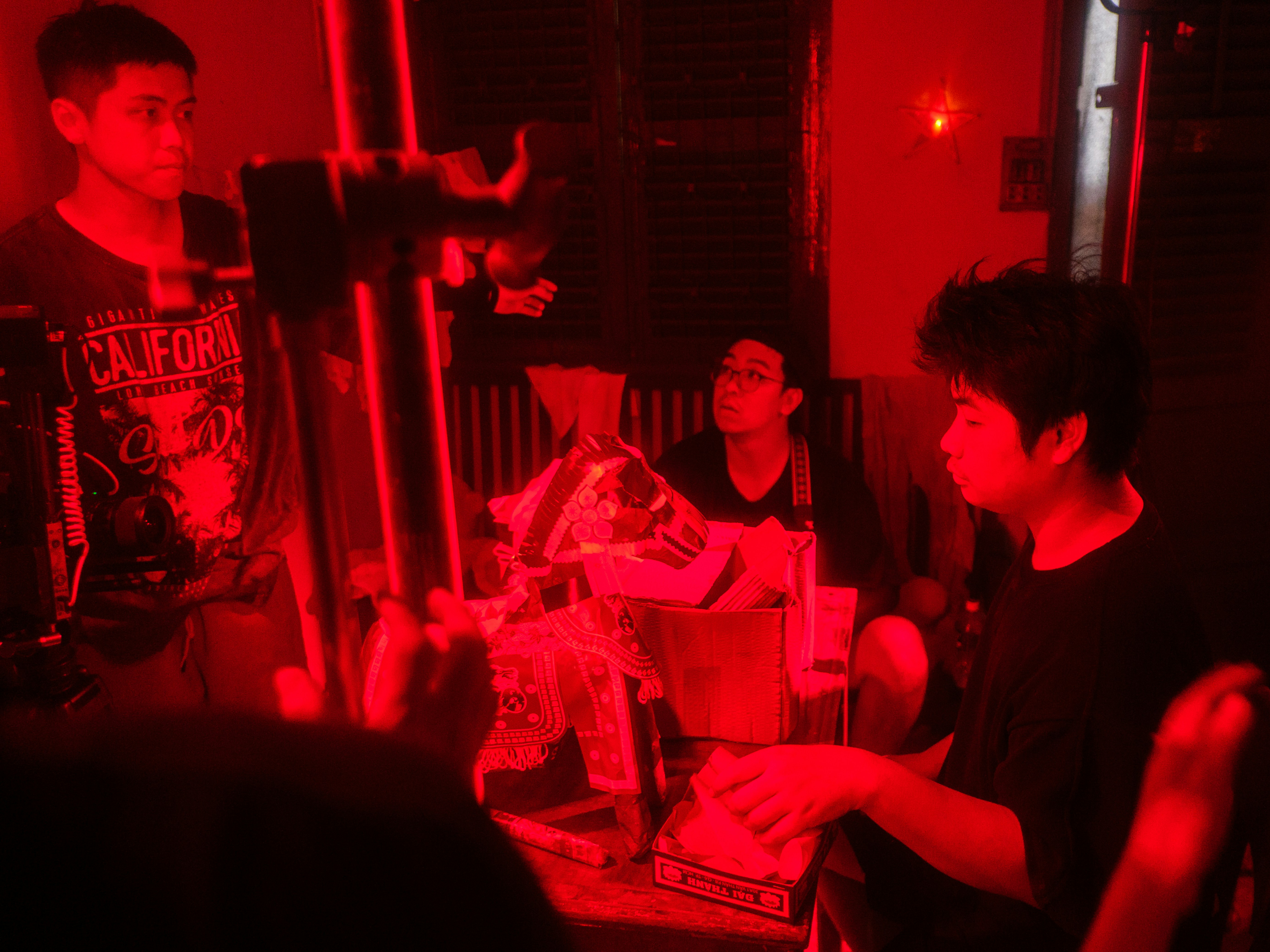 Red Room Rendezvous: Friends with a Toy Stall in Neon Glow