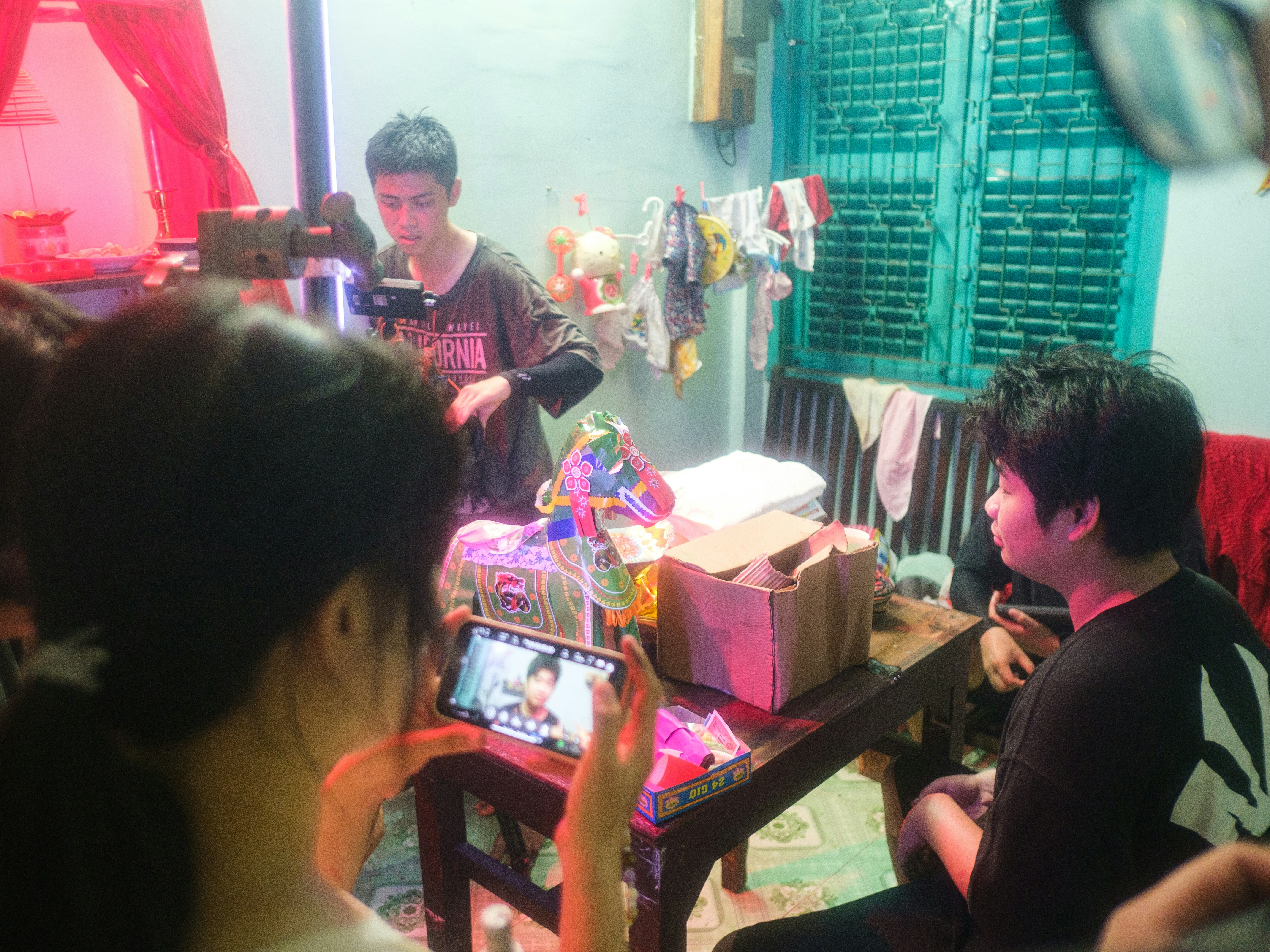 Behind the Scenes: Friends Filming a Cozy Indoor Moment