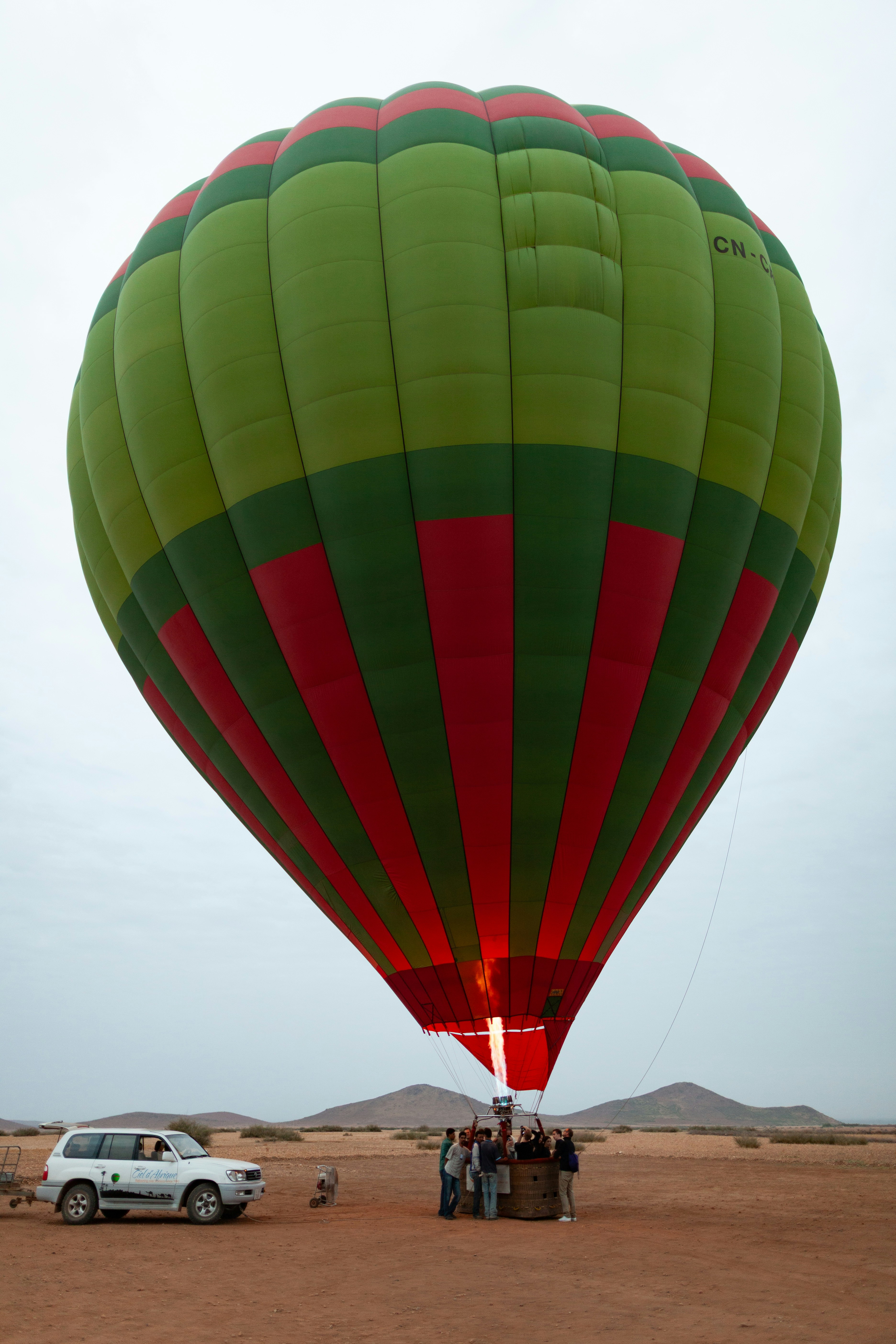 Desert Launch: A Bright Green Balloon Readies for Lift-off
