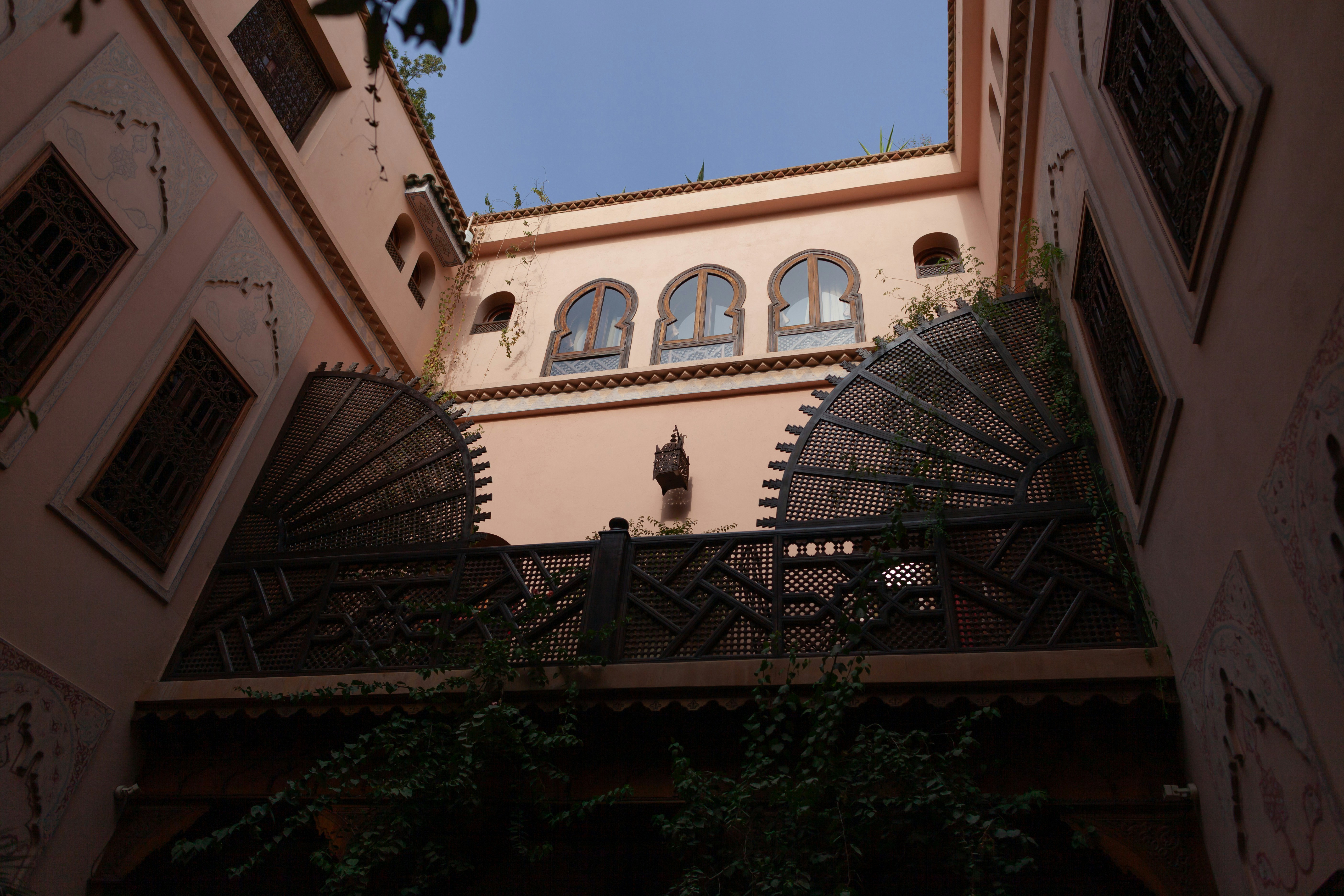 Hidden Courtyard of Arches and Ironwork
