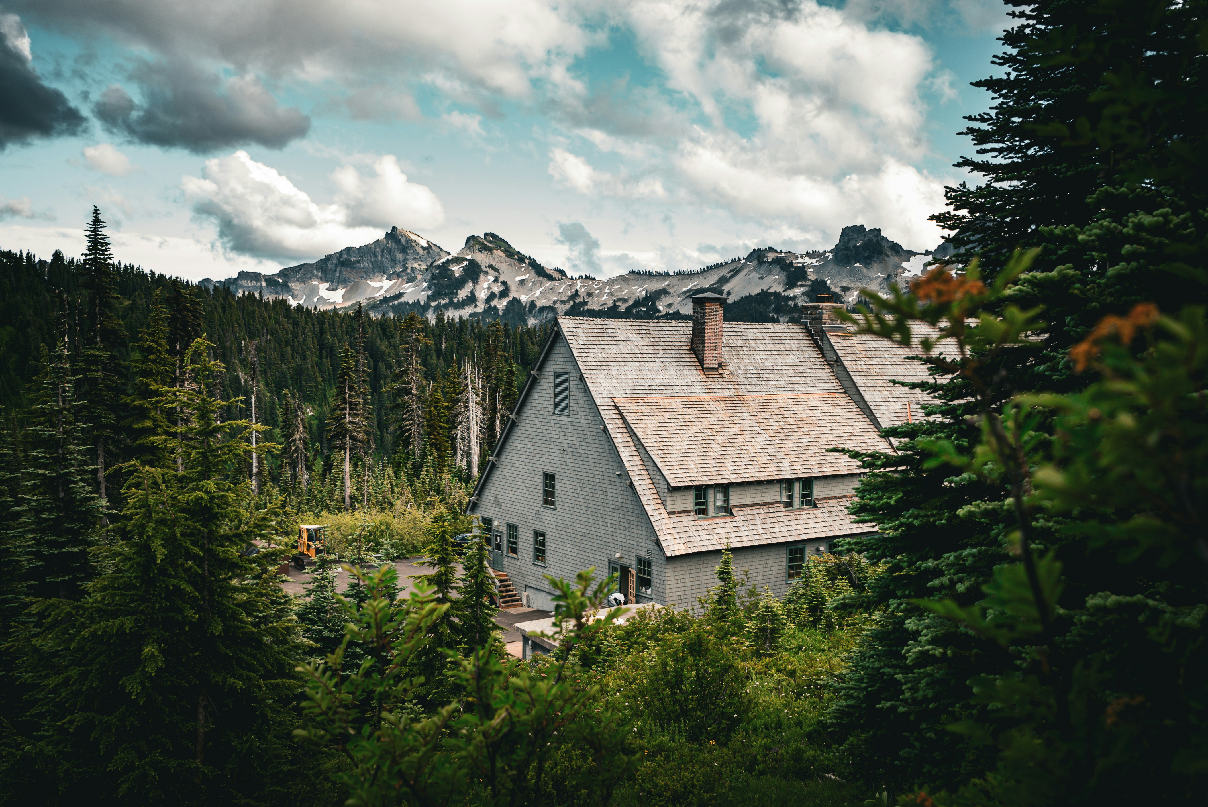 Mountain Refuge: A Stone House Amid Coniferous Silence