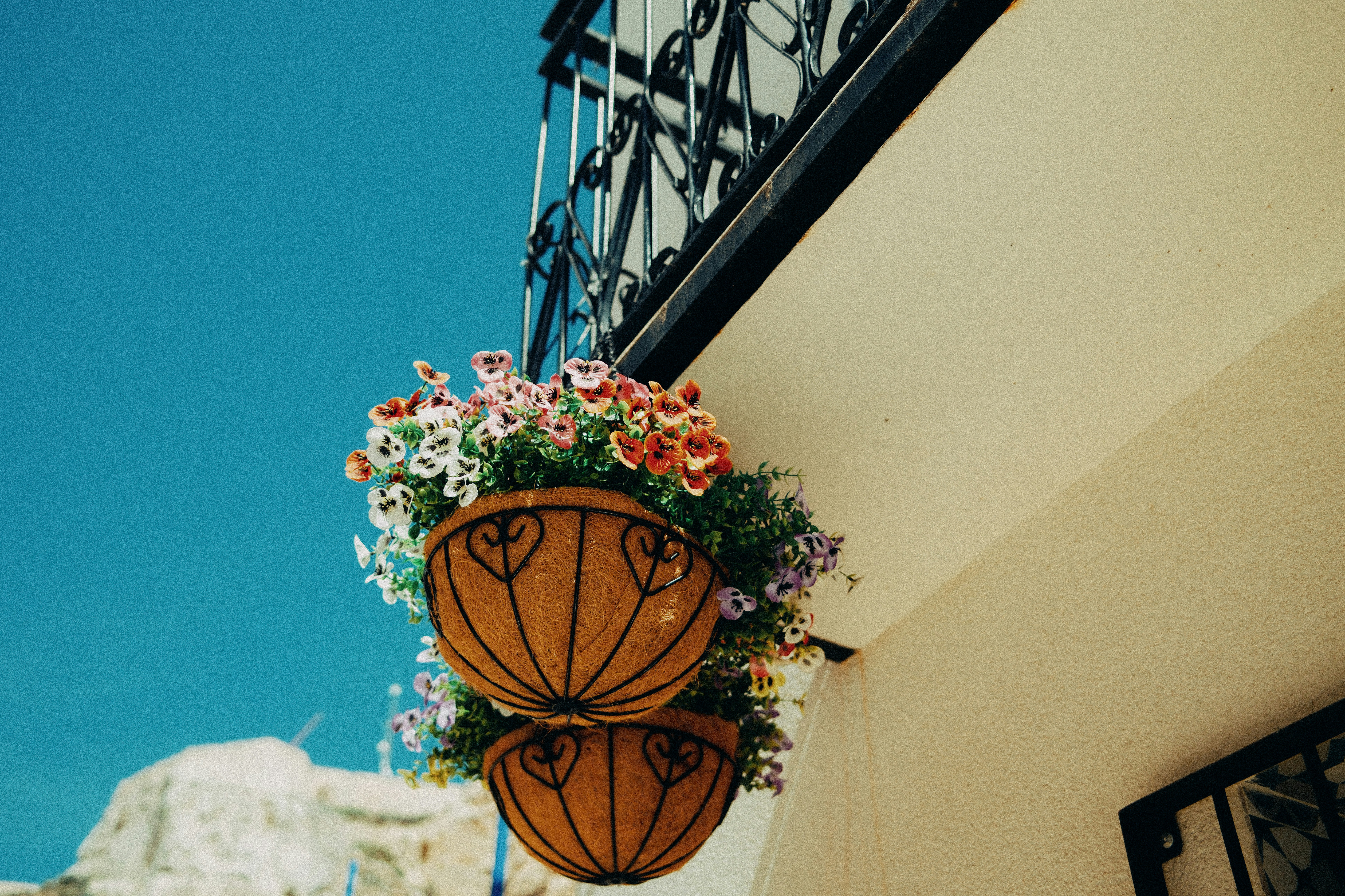 Terracotta Planters on a Sunlit Urban Wall