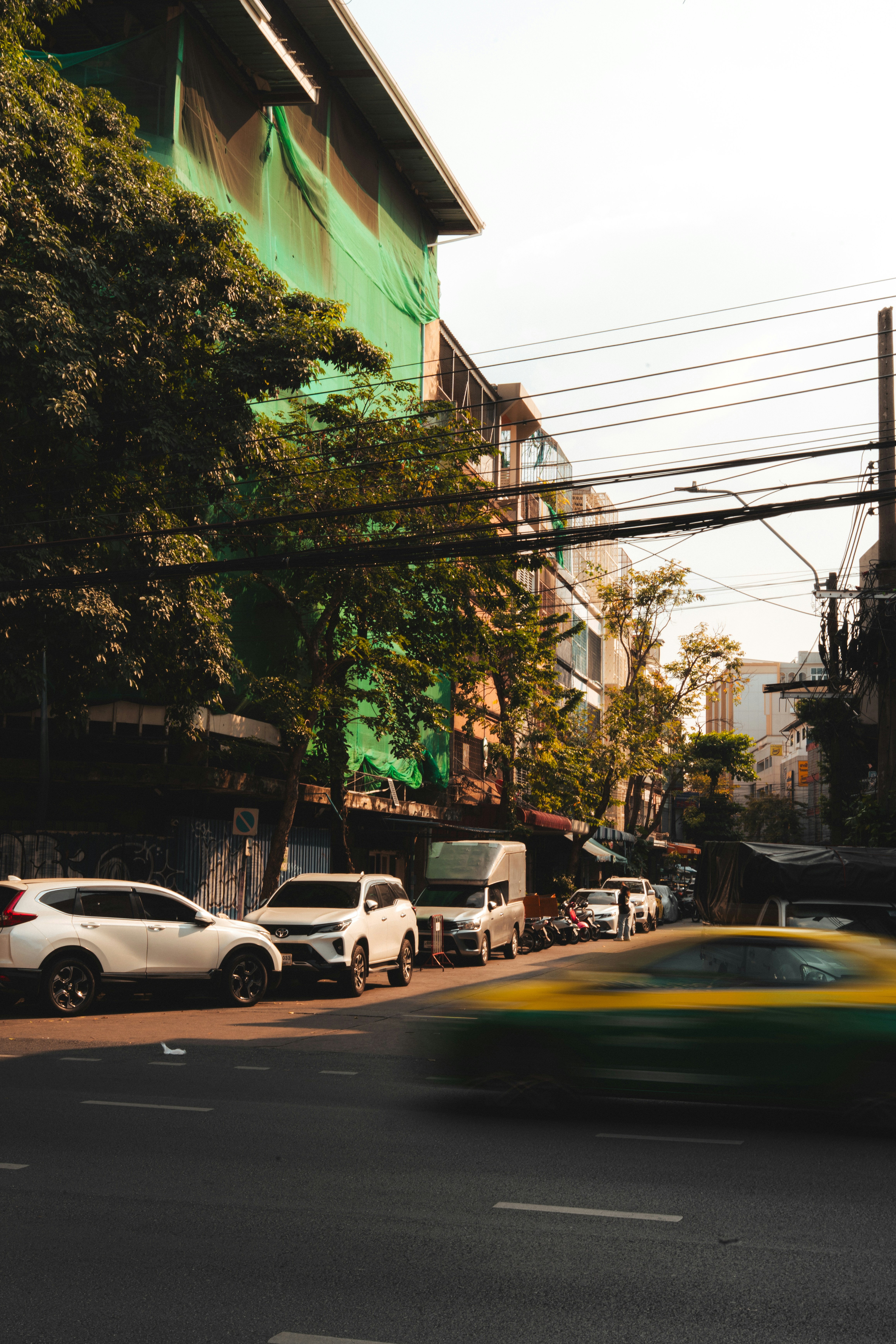 Urban Motion Blur on a Sunlit Street