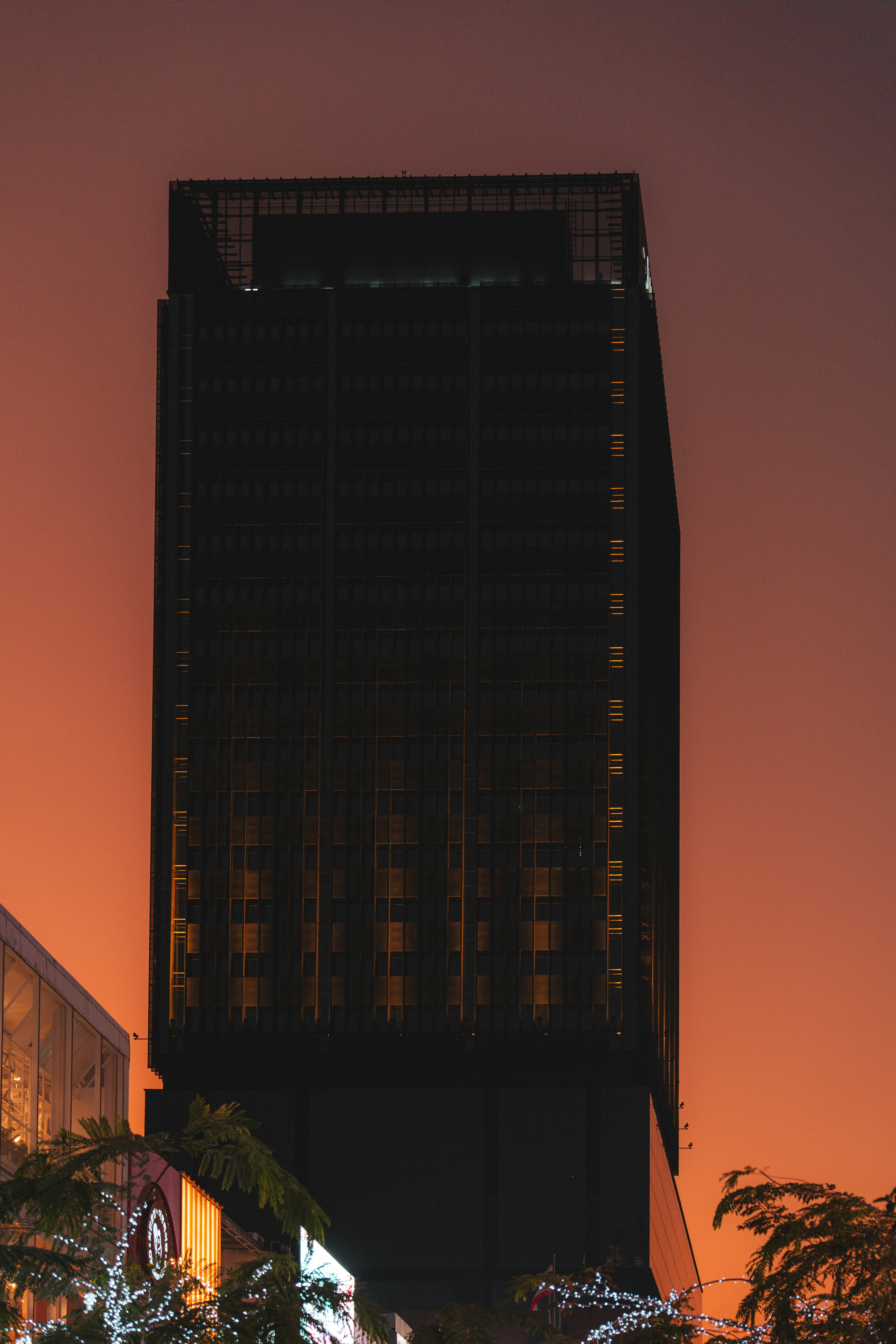 Skyline Sentinel: A Tower Silhouette Above the Ember Sky
