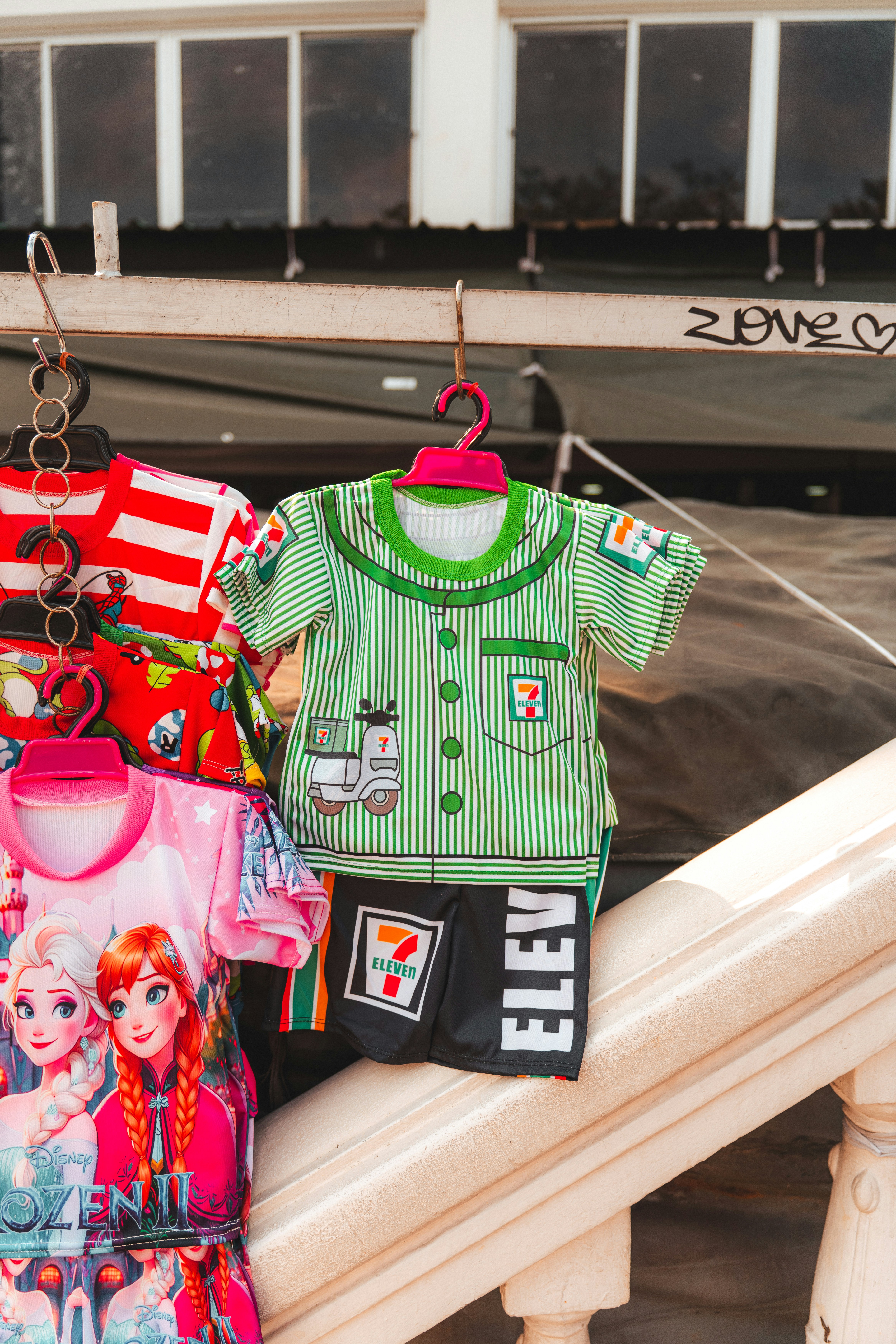 Colorful Playground: Striped Outfit on a Stand of Toy Turndown