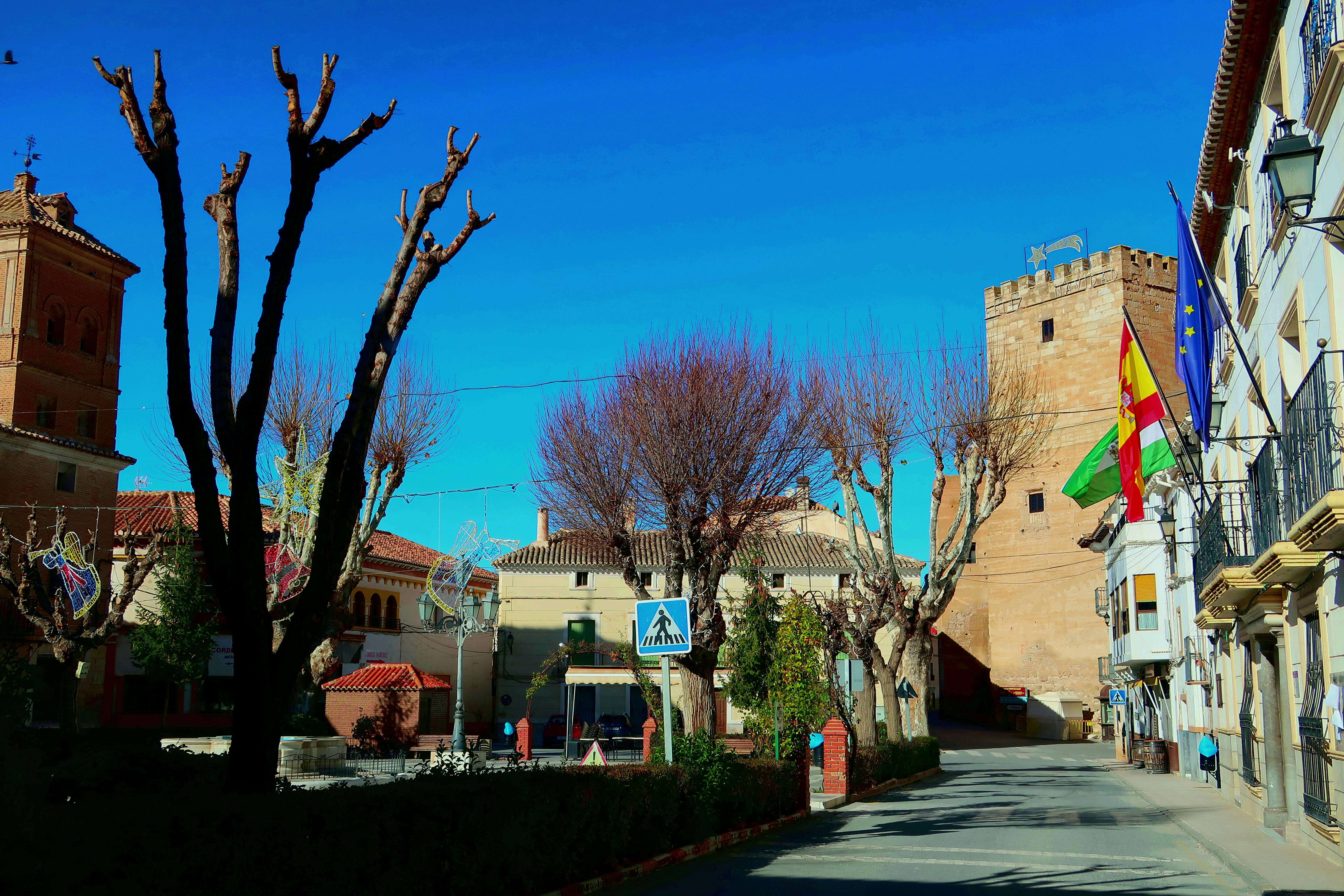 Sunlit Squares and Stone Towers: A Quiet Andalusian Street Walk