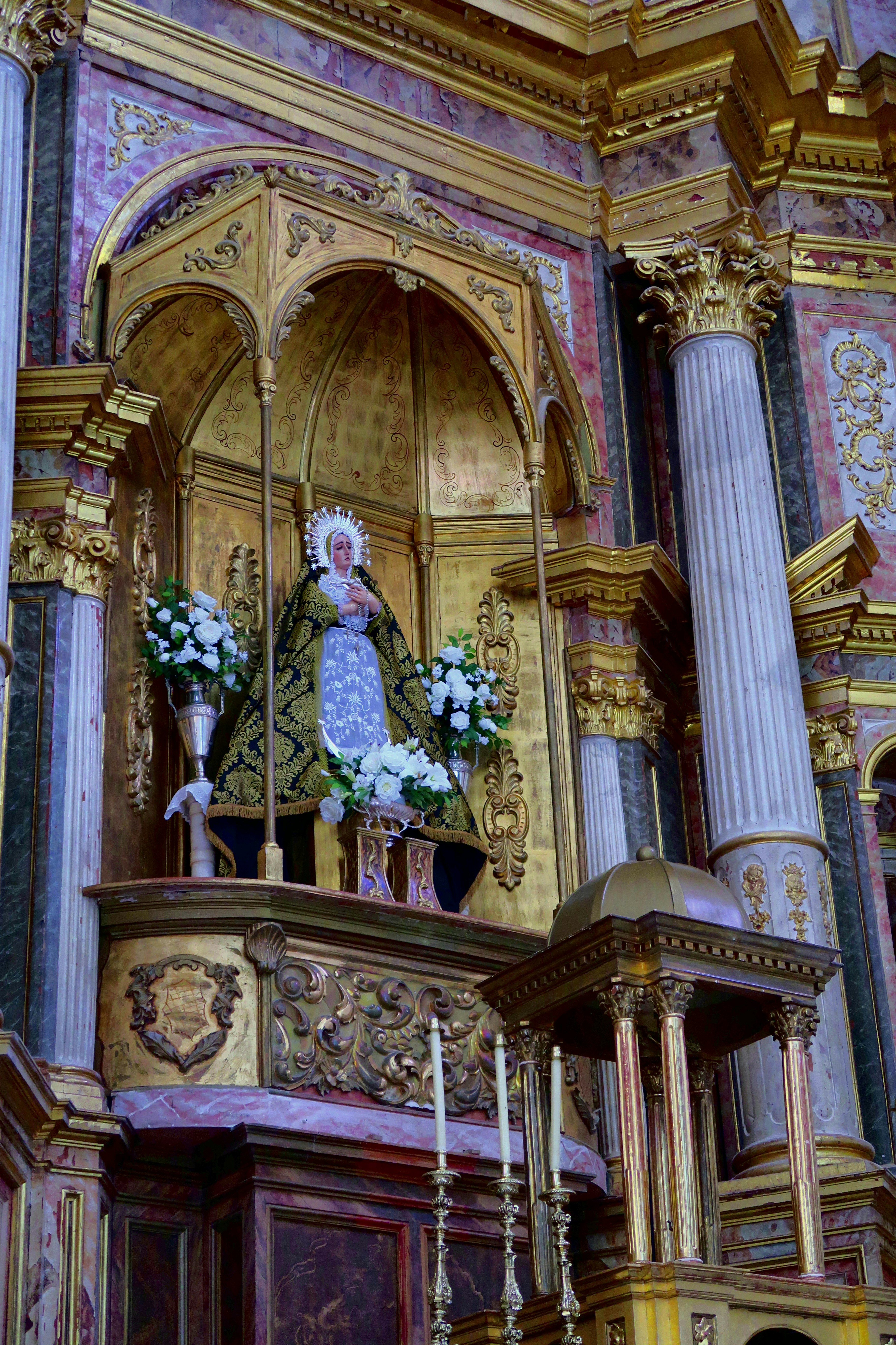 Golden Altar Shrine with Virgin Statue in Ornate Cathedral Niche