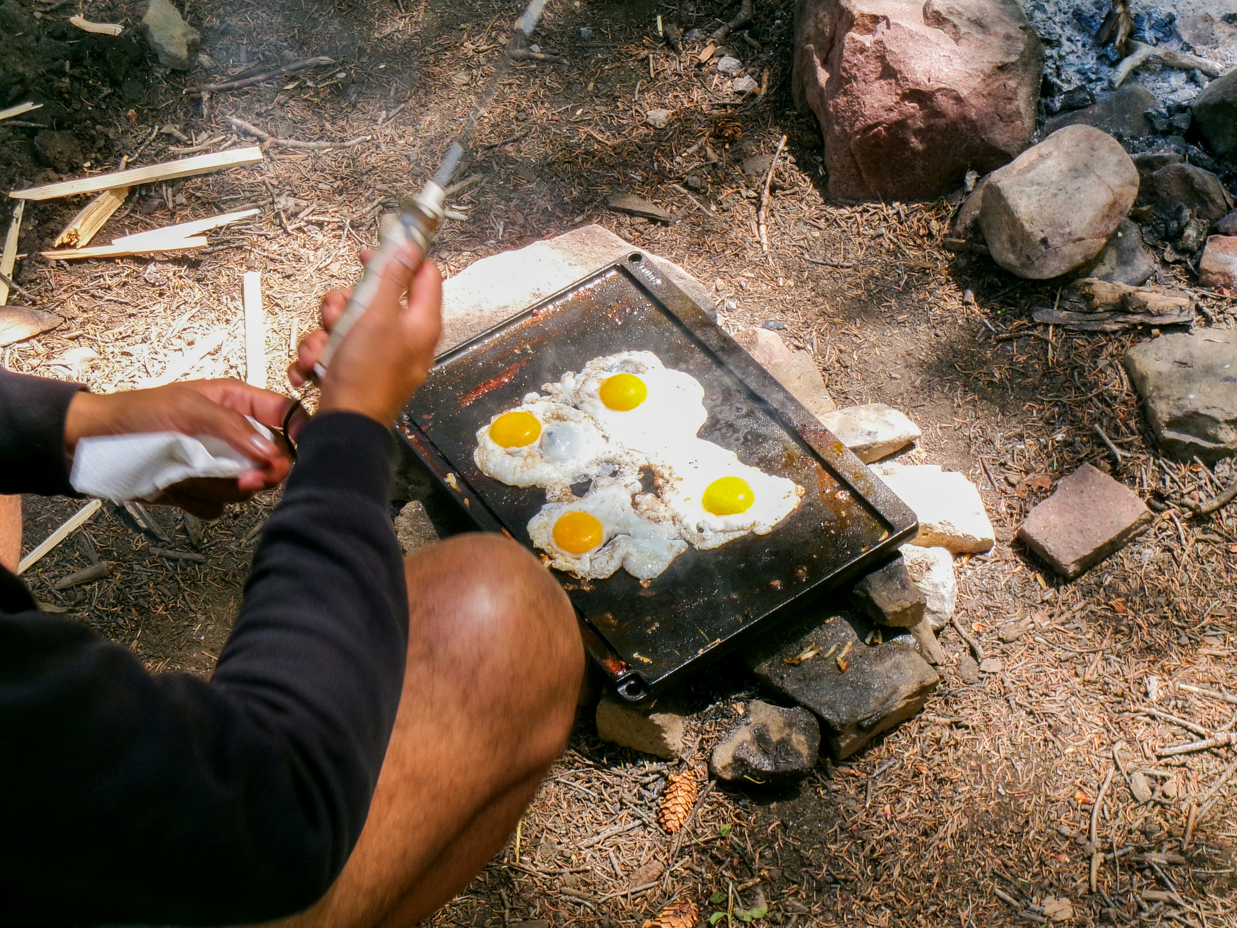 Eggs on a Cast Iron: Morning Cookout Over Stones