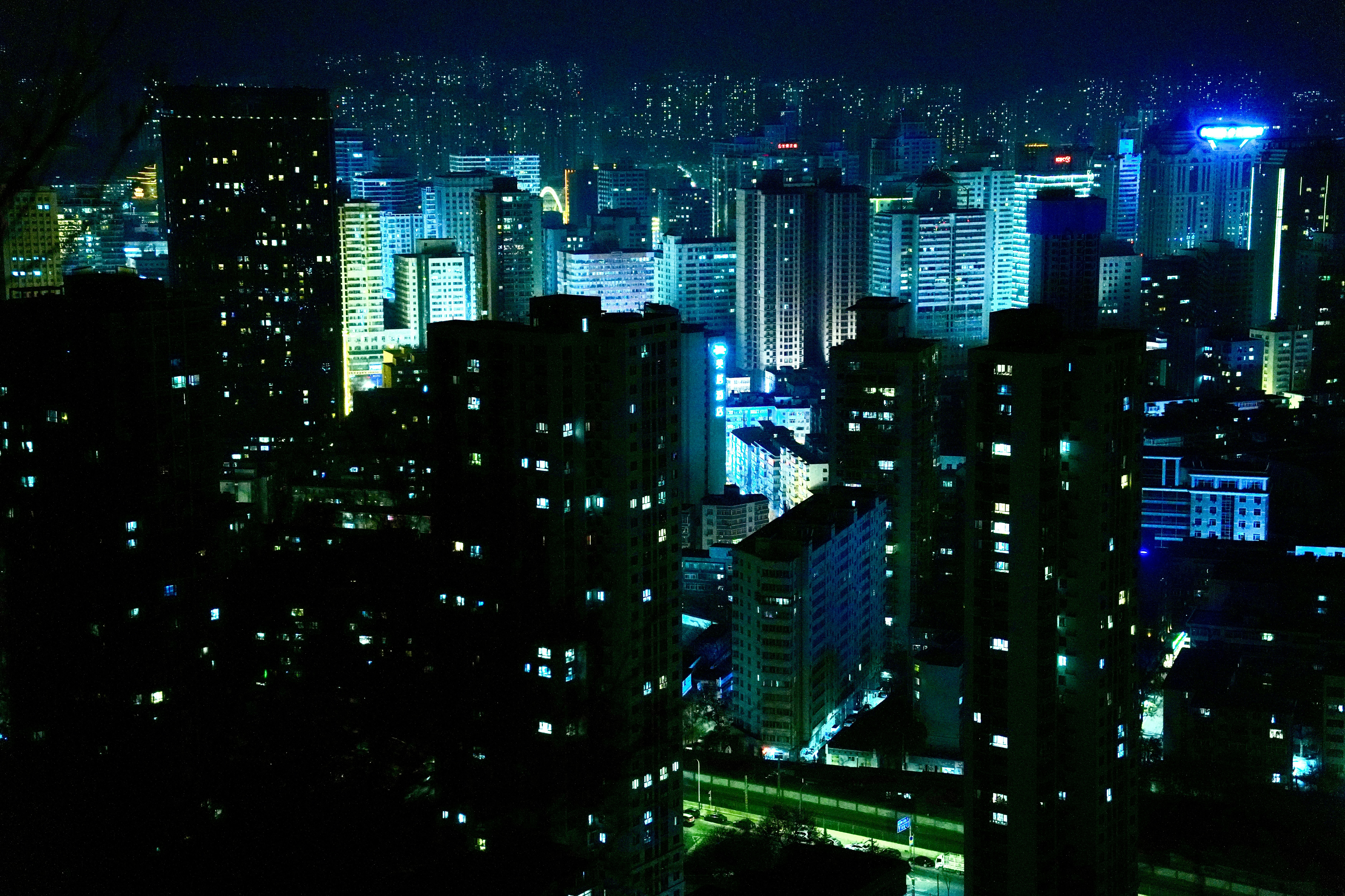 City Pulse After Dark: Neon Corridor Through the Skyscrapers