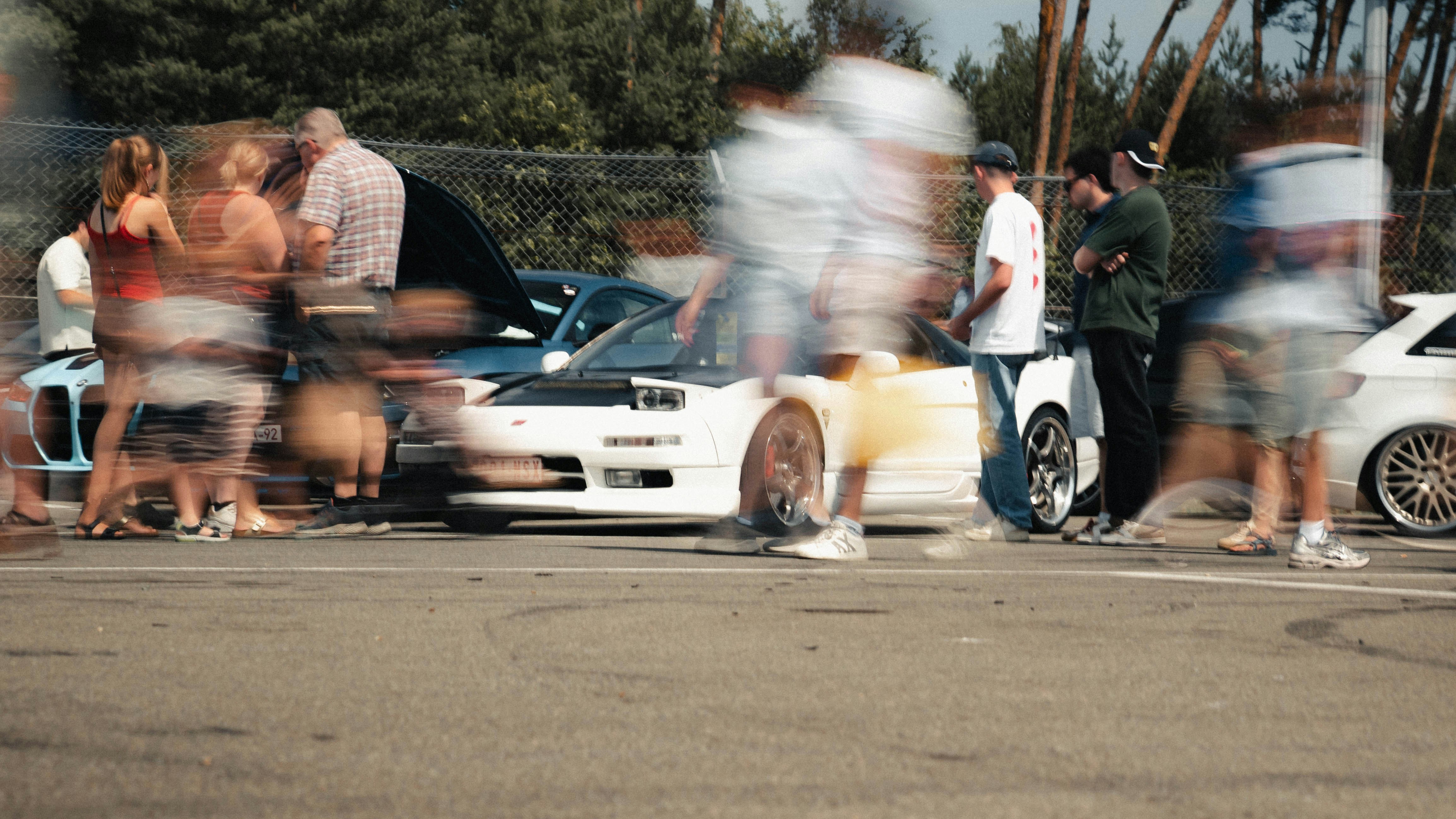 Crowd-Touched Car Meet: Motion Blur and Quiet Drama