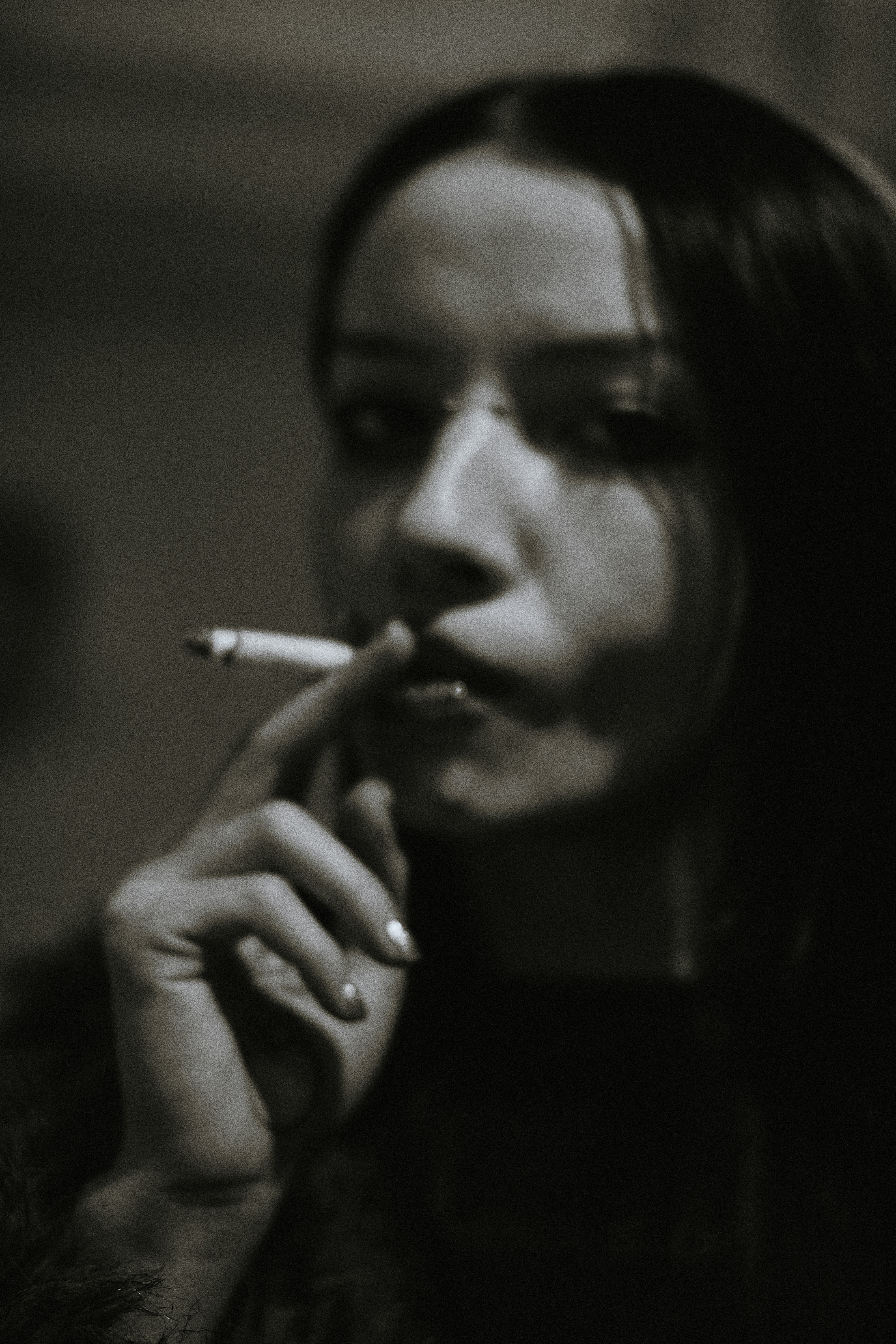 Smoke and Silhouette: A Quiet Moment in Monochrome Night