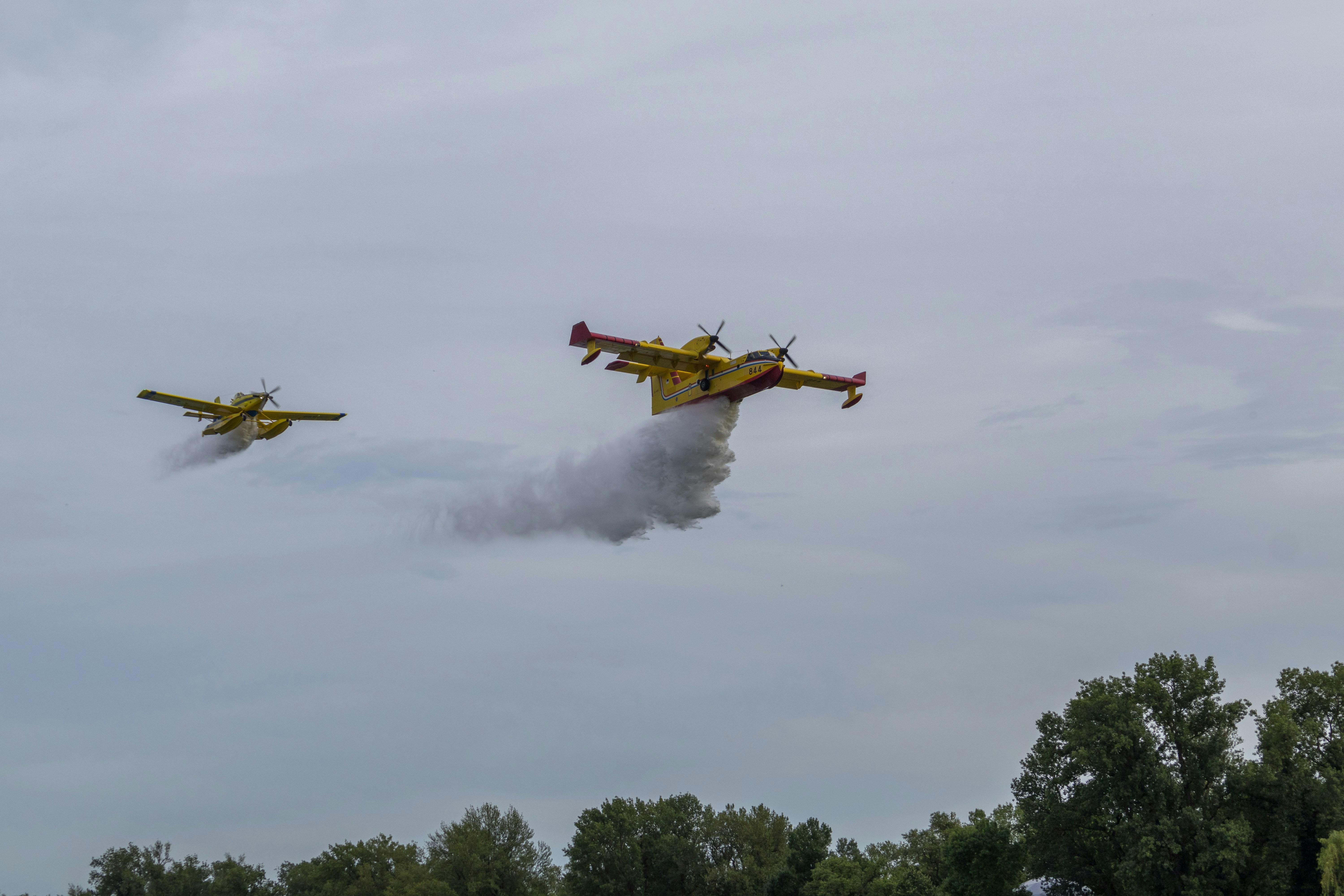 Aerial Smoke and Wings: Firefighting Planes in Formation