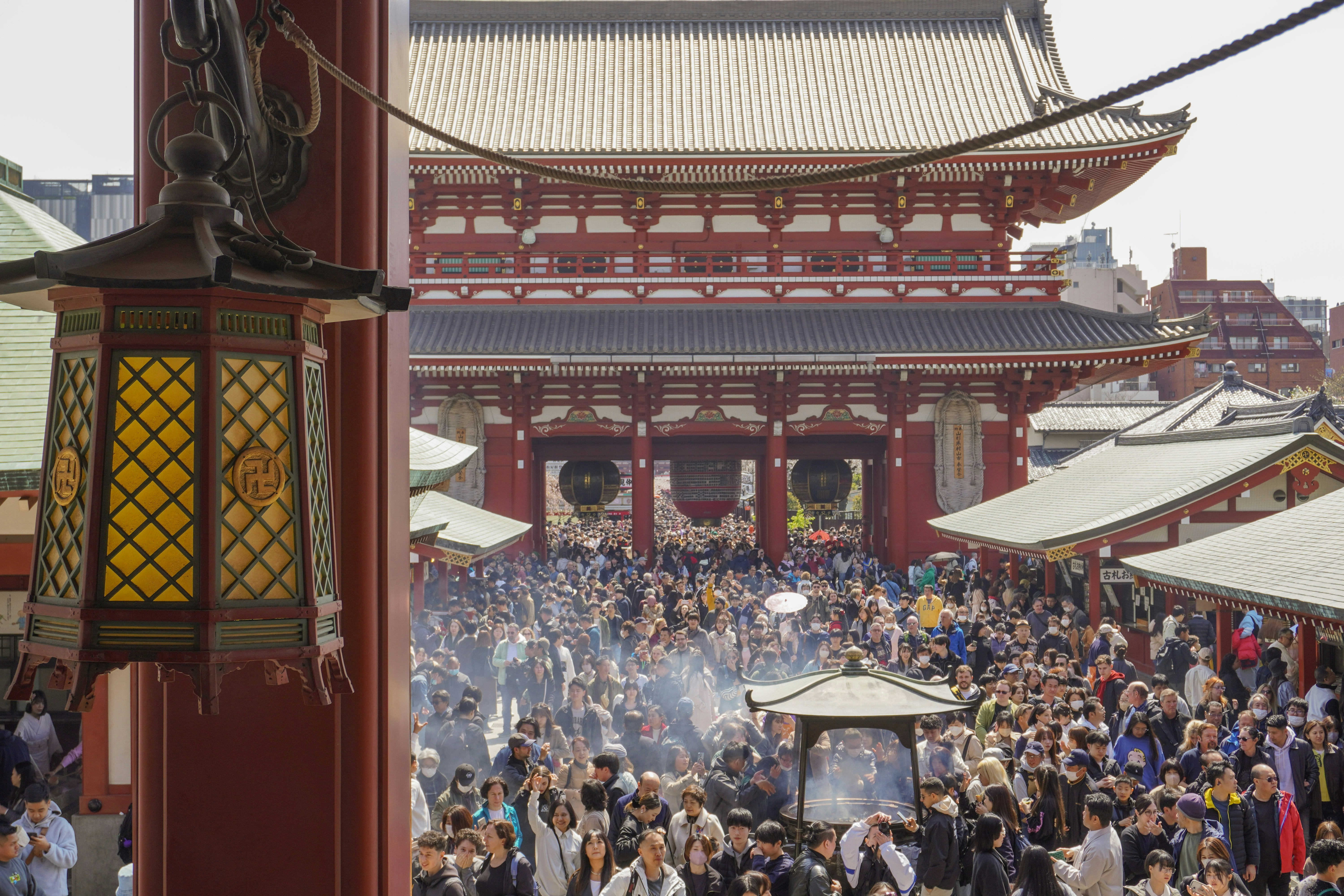 Crowd Beneath the Gate: A Courtyard Festival at a Traditional Temple